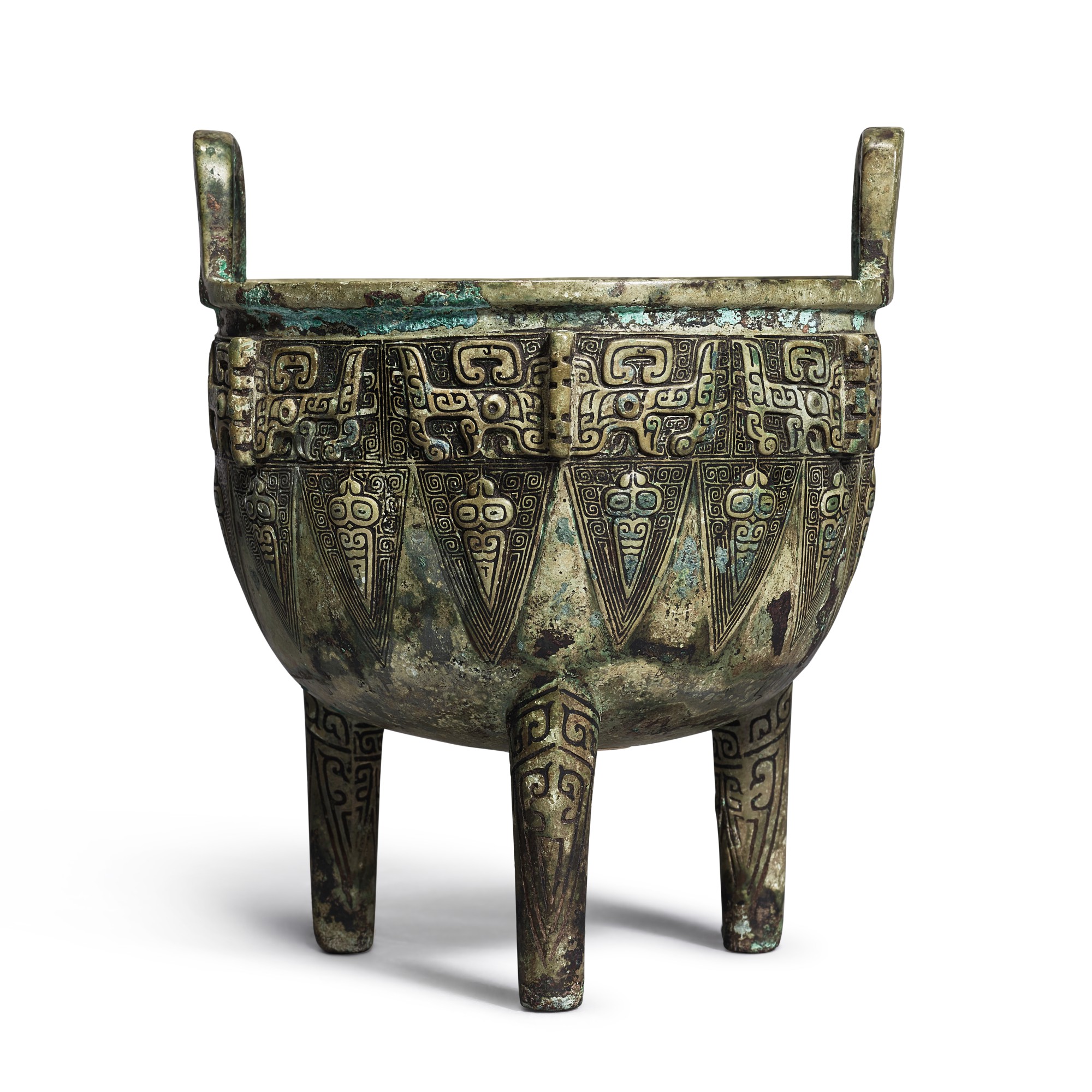 A superb inscribed archaic bronze 'animal mask' food vessel (ding ...
