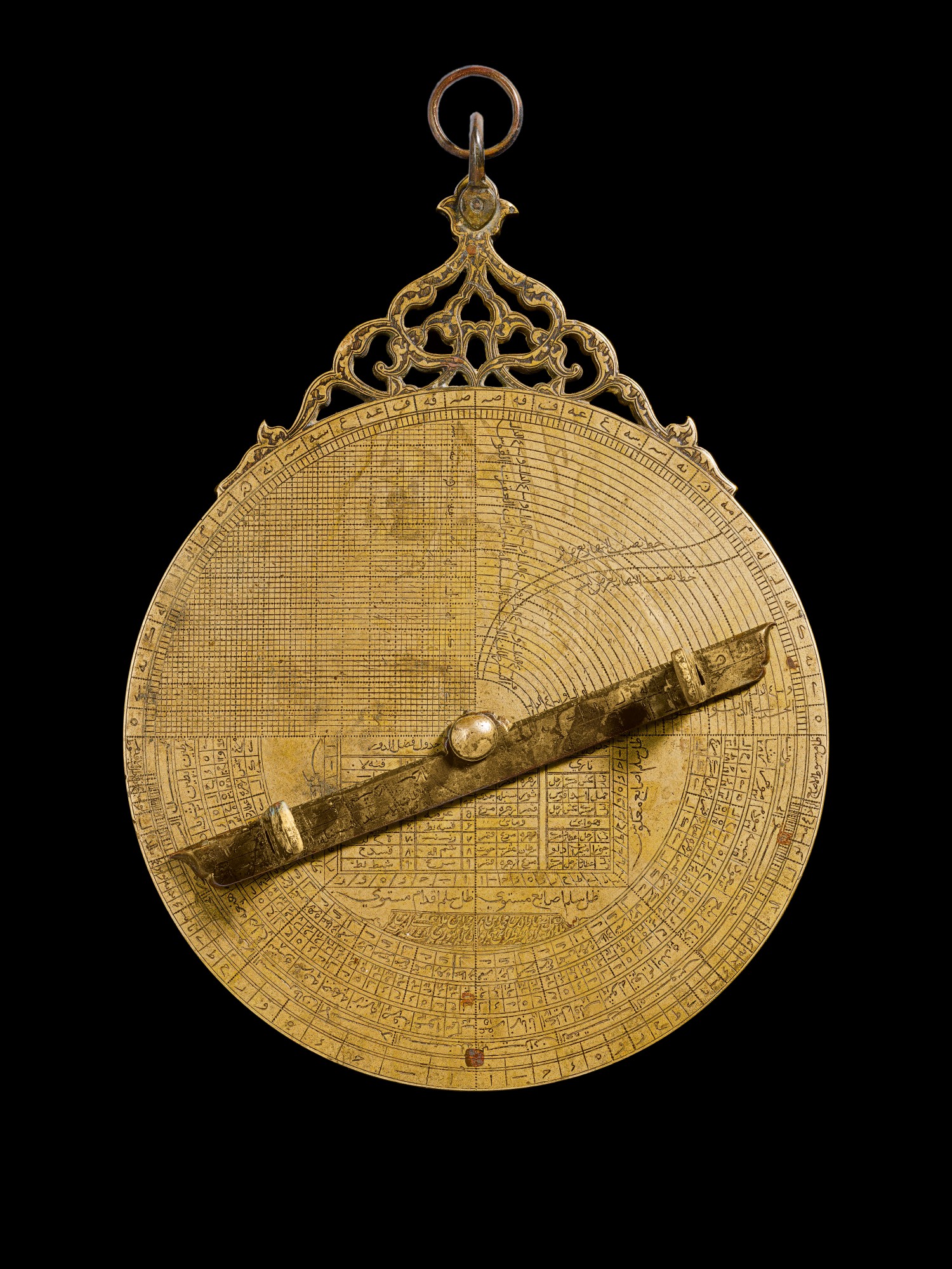 A large royal Mughal planispheric brass astrolabe, signed by Diya' al ...