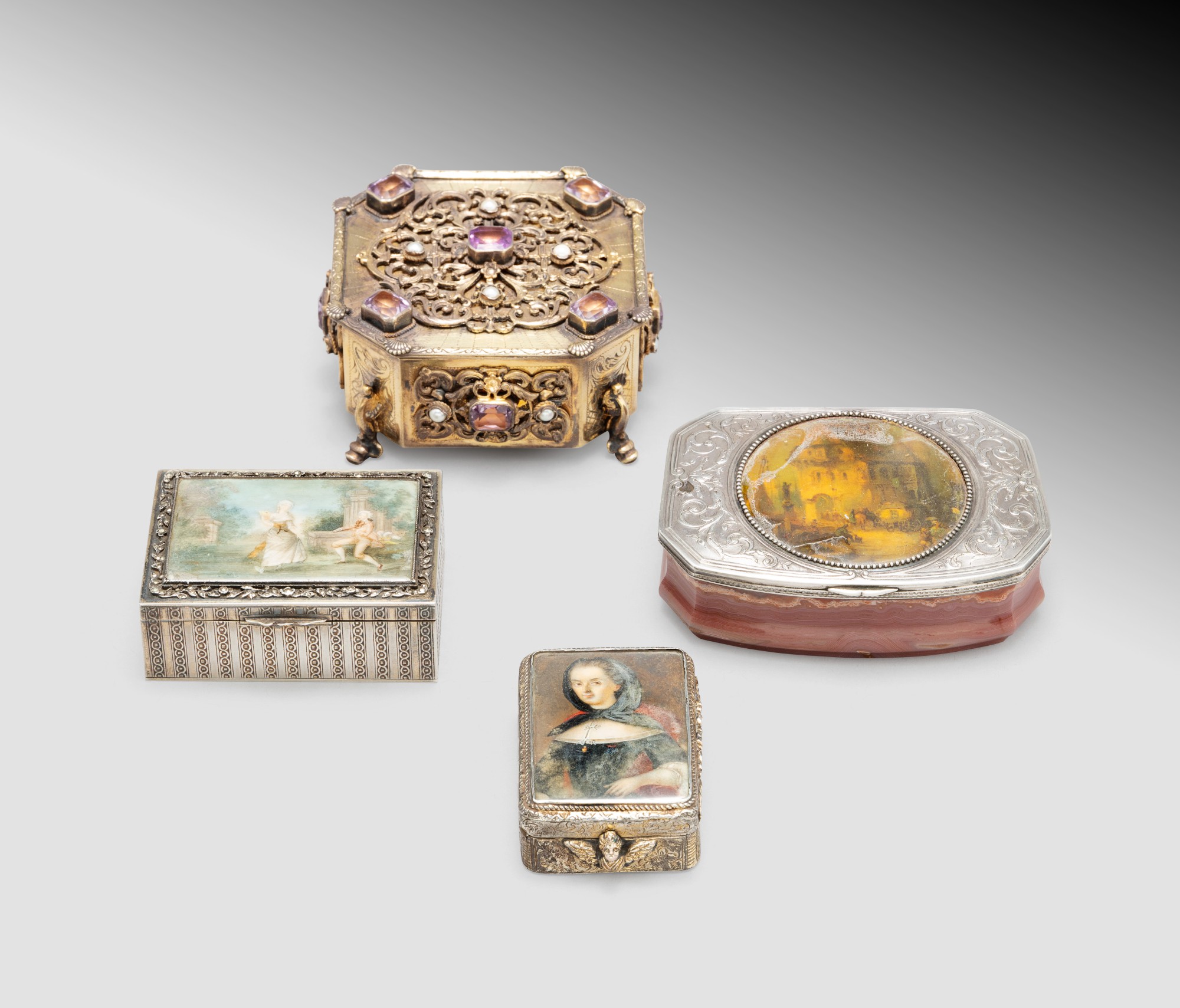 A group of three silver and silver-gilt boxes, and one silver-plated ...