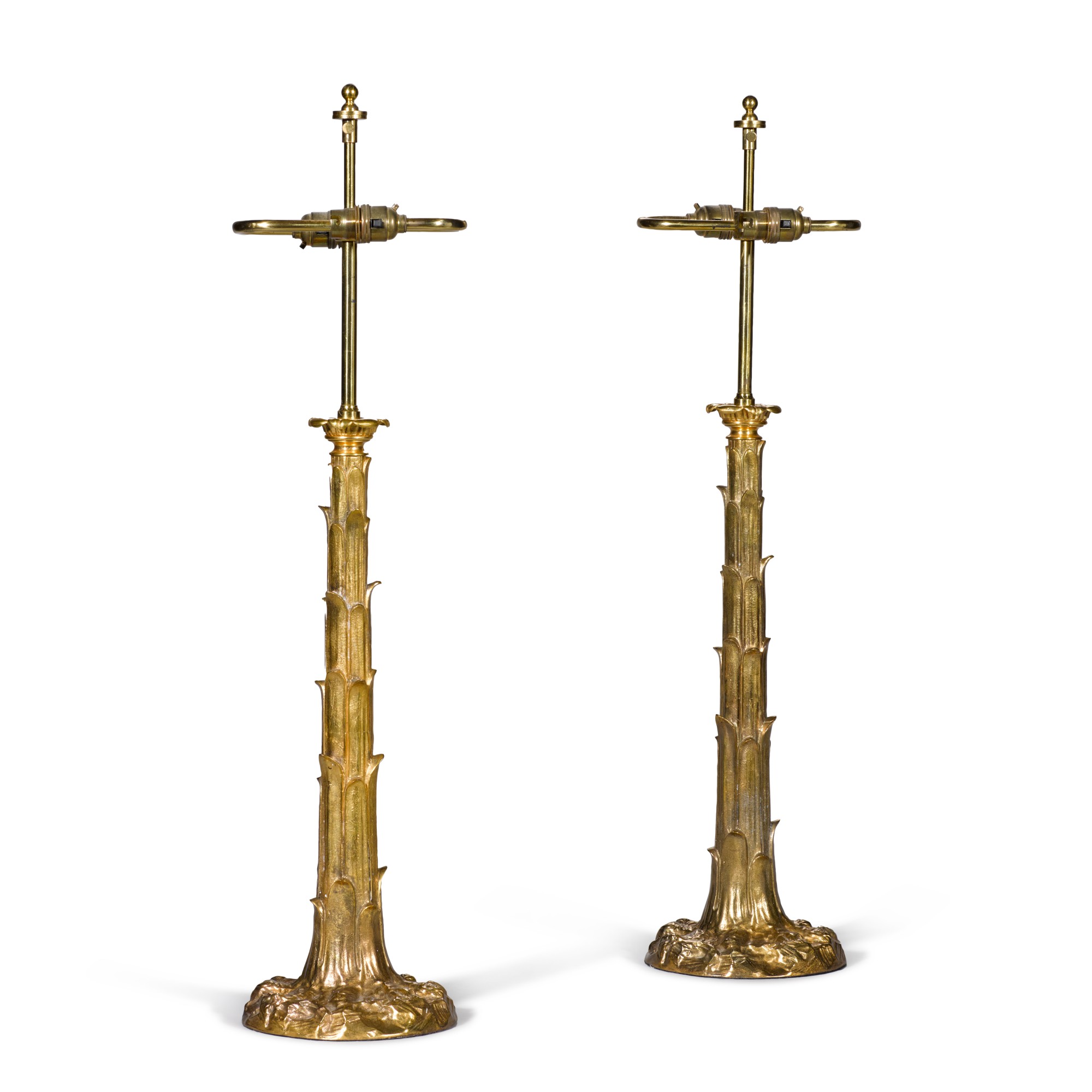 A pair of George IV style gilt-lacquered brass lamps, 20th century, in ...