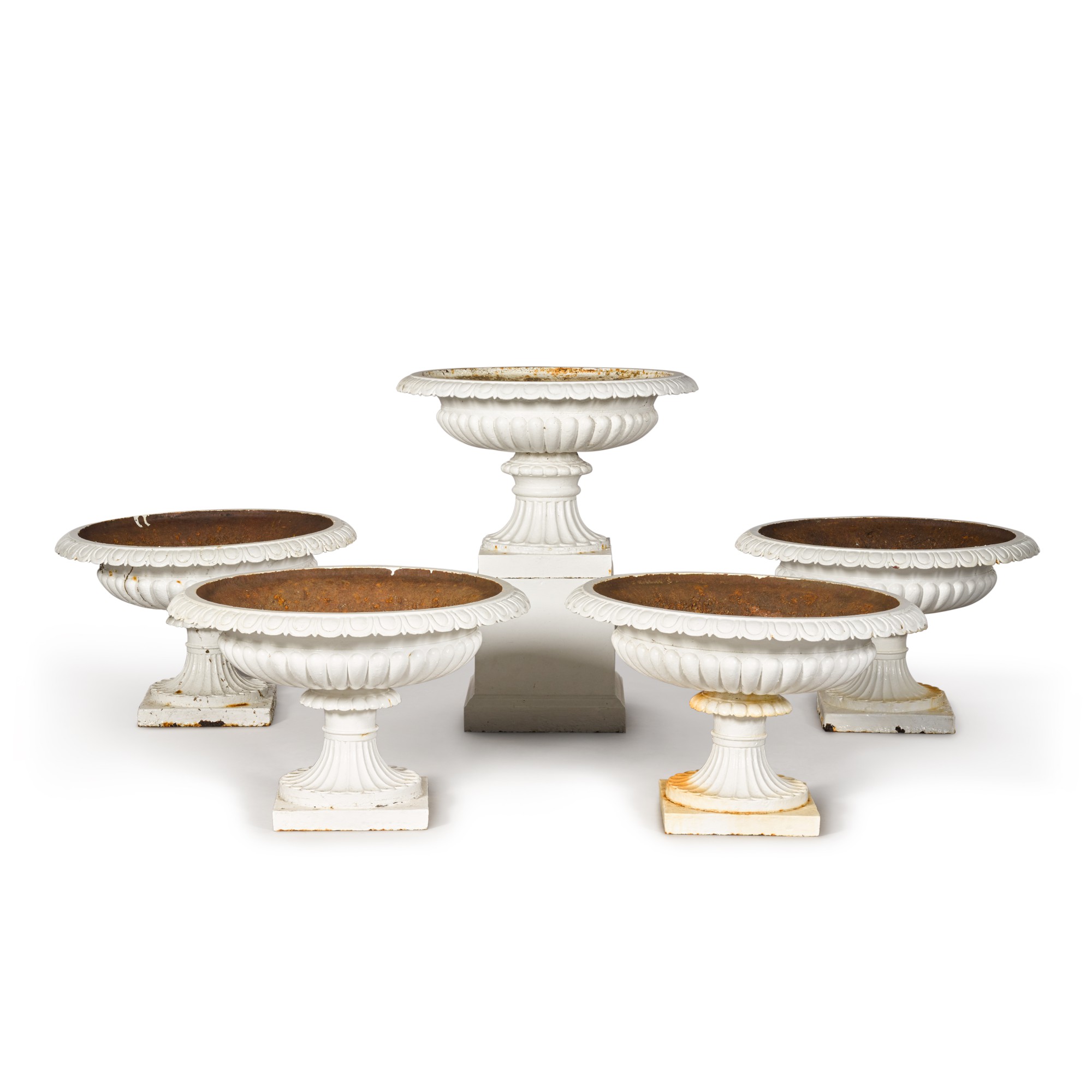 A set of four Victorian cast iron garden urns, late 19th/20th century ...