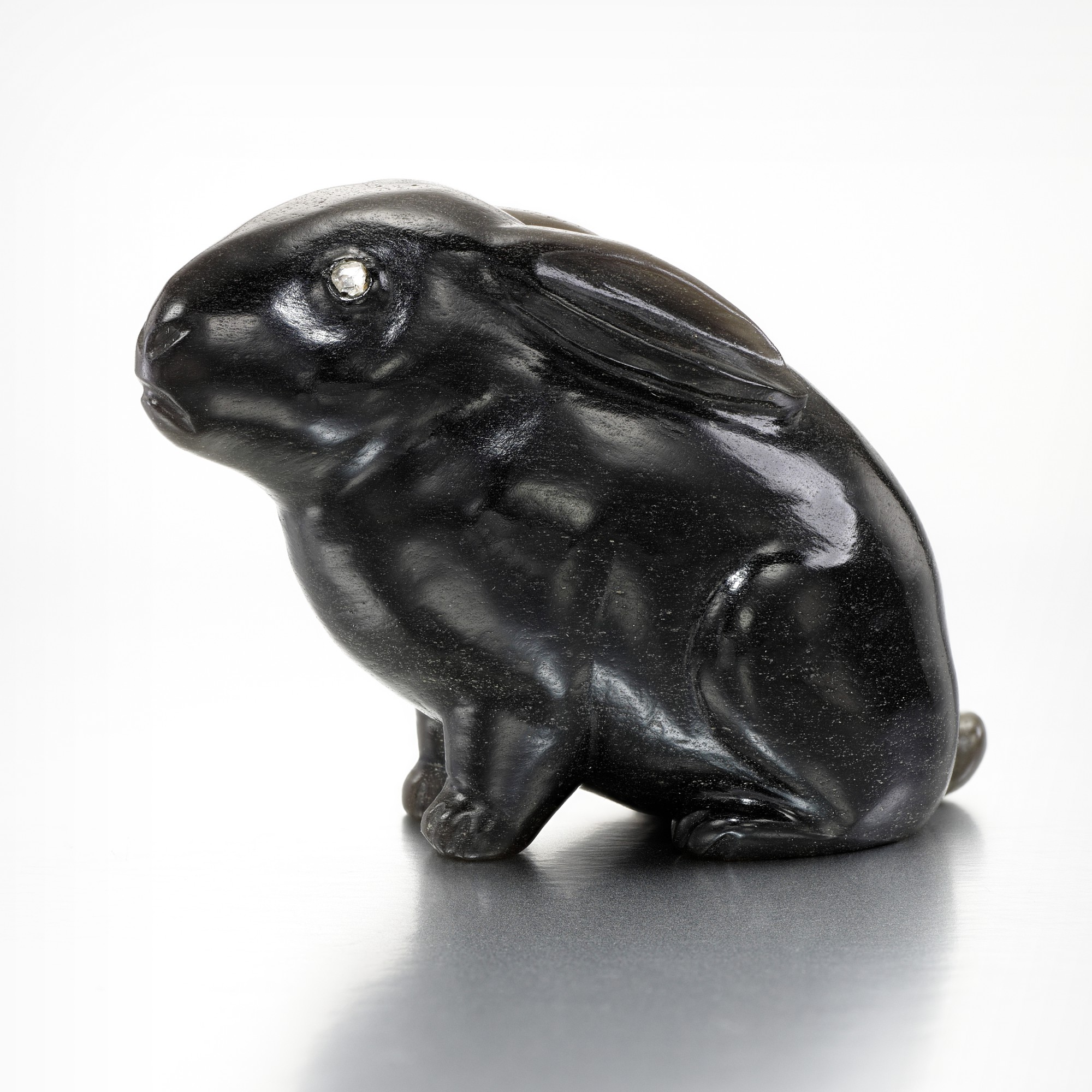 A FABERGÉ JEWELLED OBSIDIAN MODEL OF A RABBIT, ST PETERSBURG, CIRCA ...