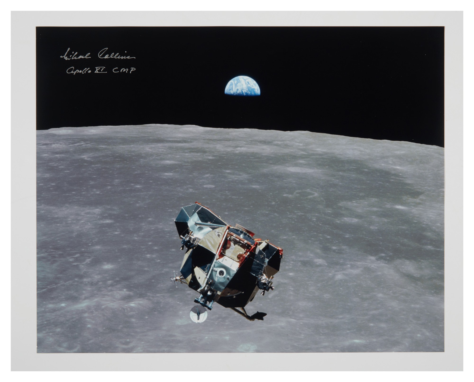 [Apollo 11] — Eagle's Ascent. Color photograph, signed and inscribed by ...