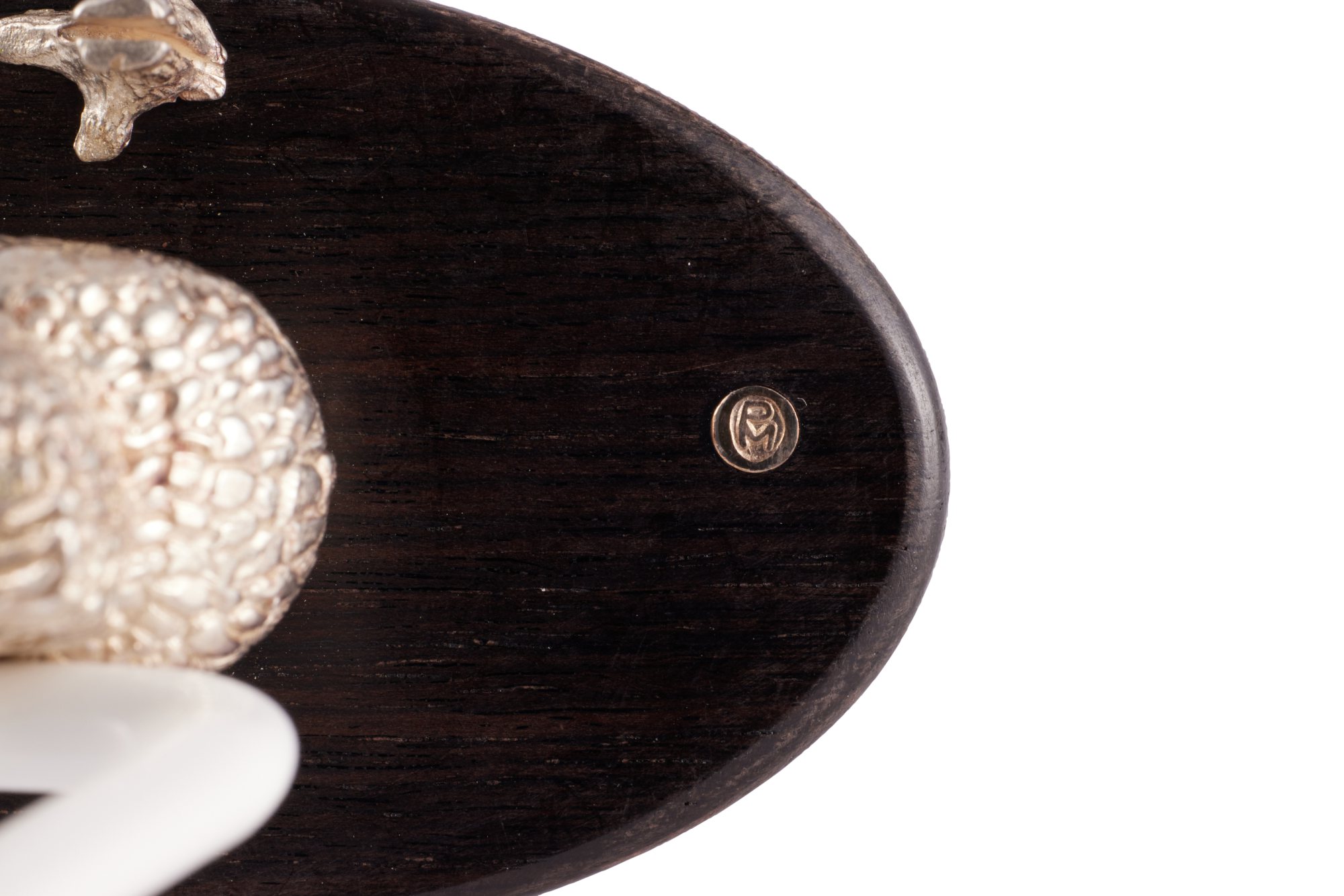 A Set of Twenty-Four Zimbabwean Silver and Wood Animal Place Card ...