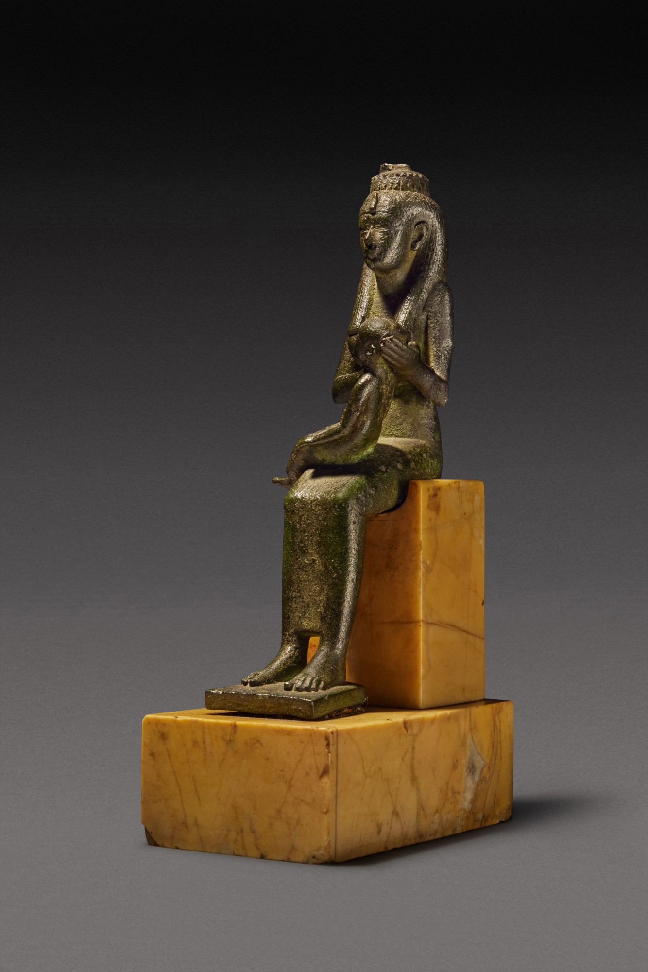 An Egyptian Bronze Figure of Isis with Horus, 26th Dynasty, 664-525 B.C ...