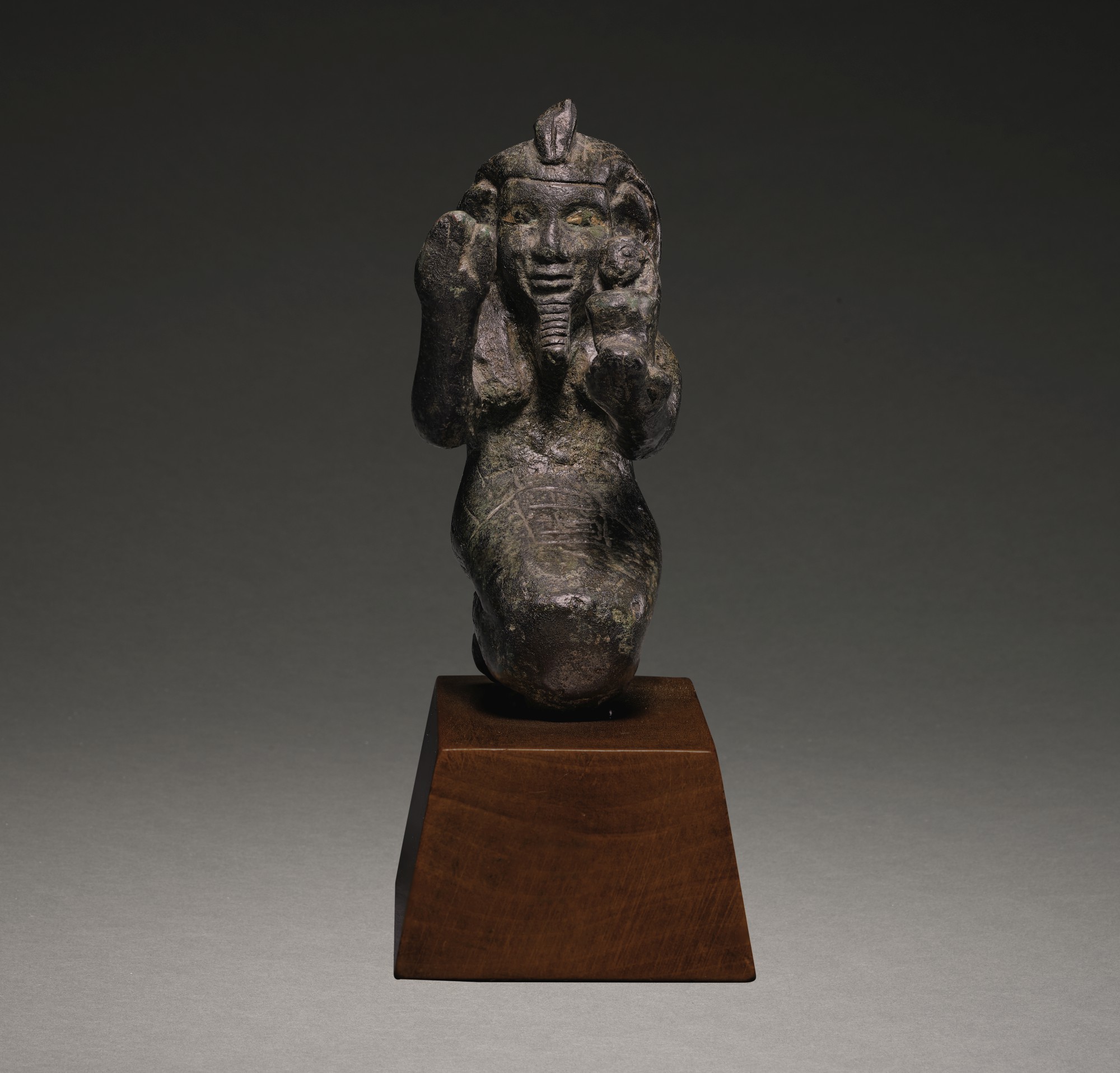 AN EGYPTIAN BRONZE FIGURE OF A KUSHITE KING, 25TH DYNASTY, 750-656 B.C ...