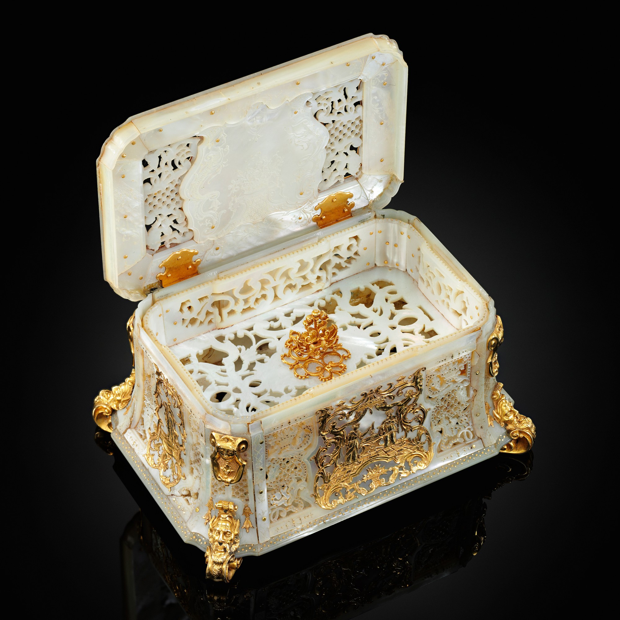 A mother of pearl casket with gold appliqué, mounts and piqué point ...