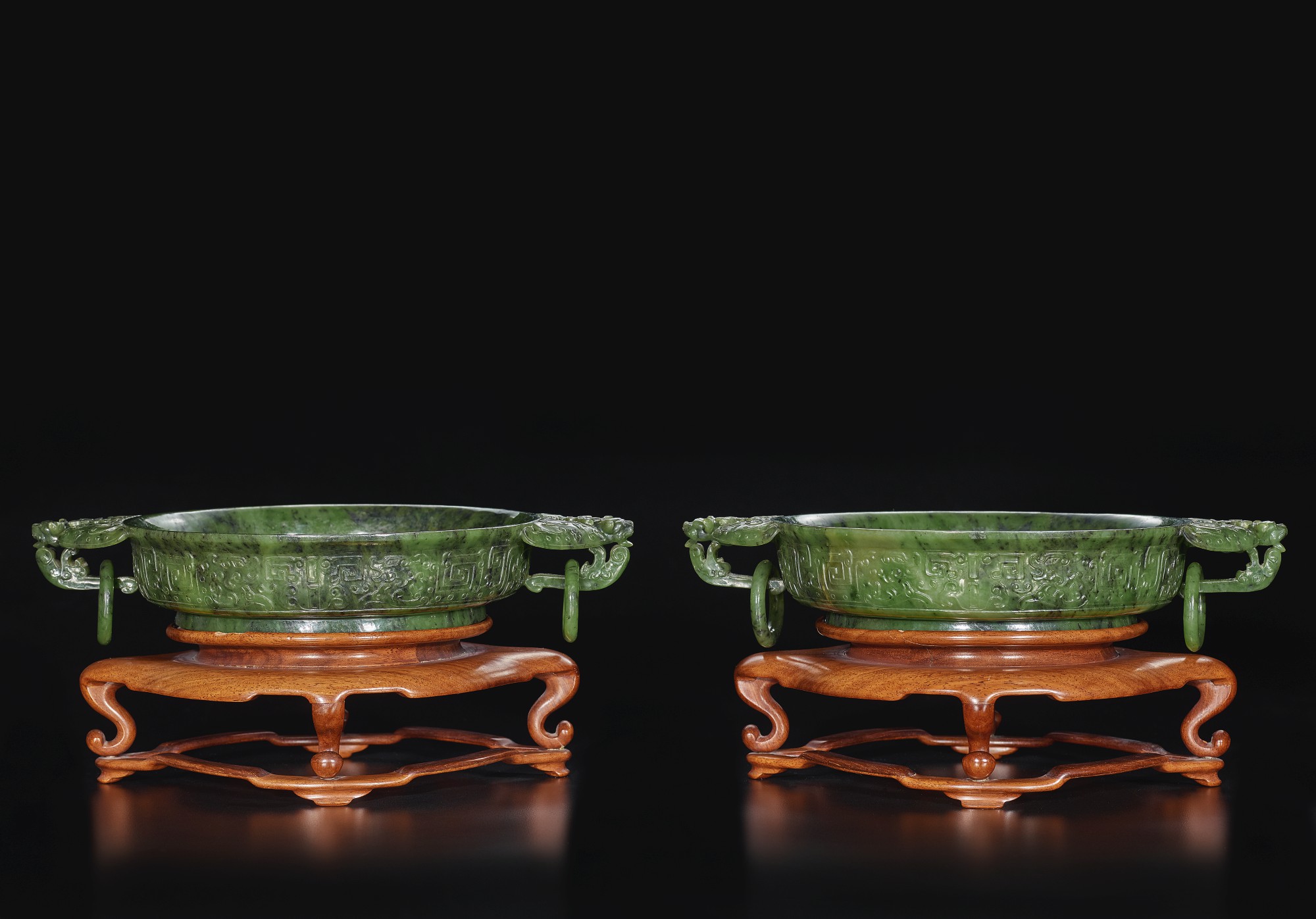 A pair of spinach-green jade shallow bowls, Qing dynasty, 19th / 20th ...