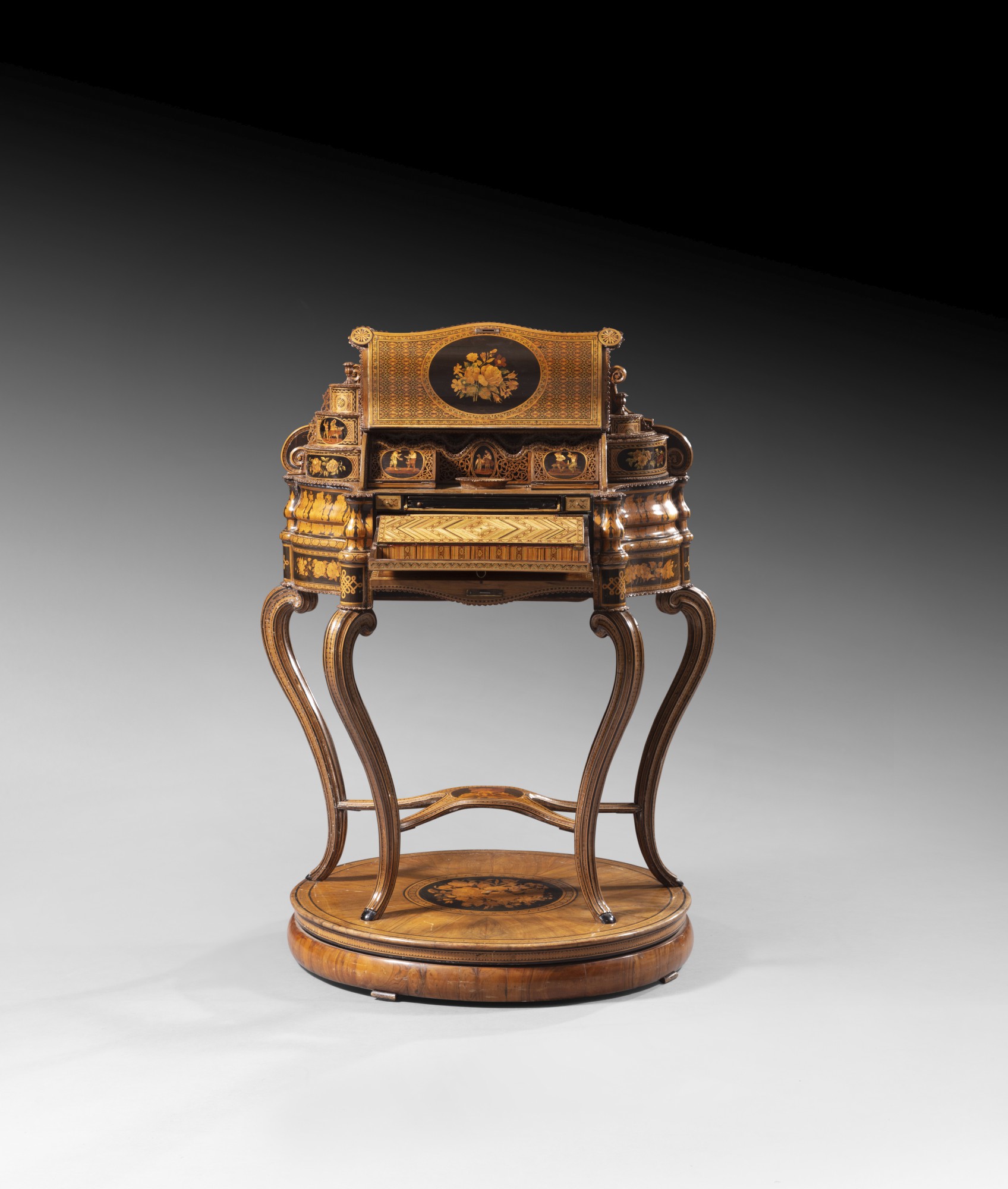 A rare marquetry desk with multiple combinations, signed Joseph ...