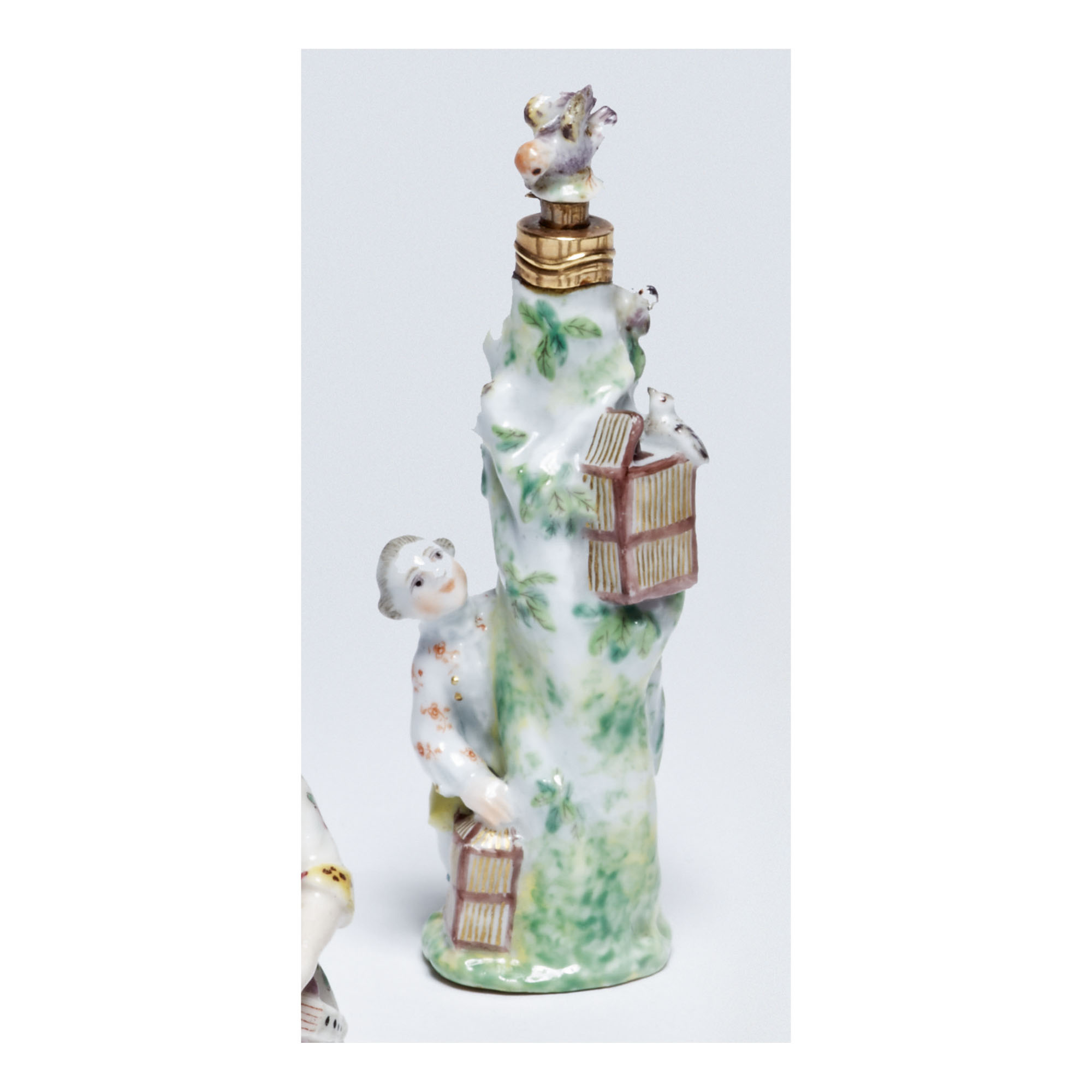 A CHELSEA PORCELAIN GOLD-MOUNTED SCENT BOTTLE AND STOPPER IN THE FORM ...