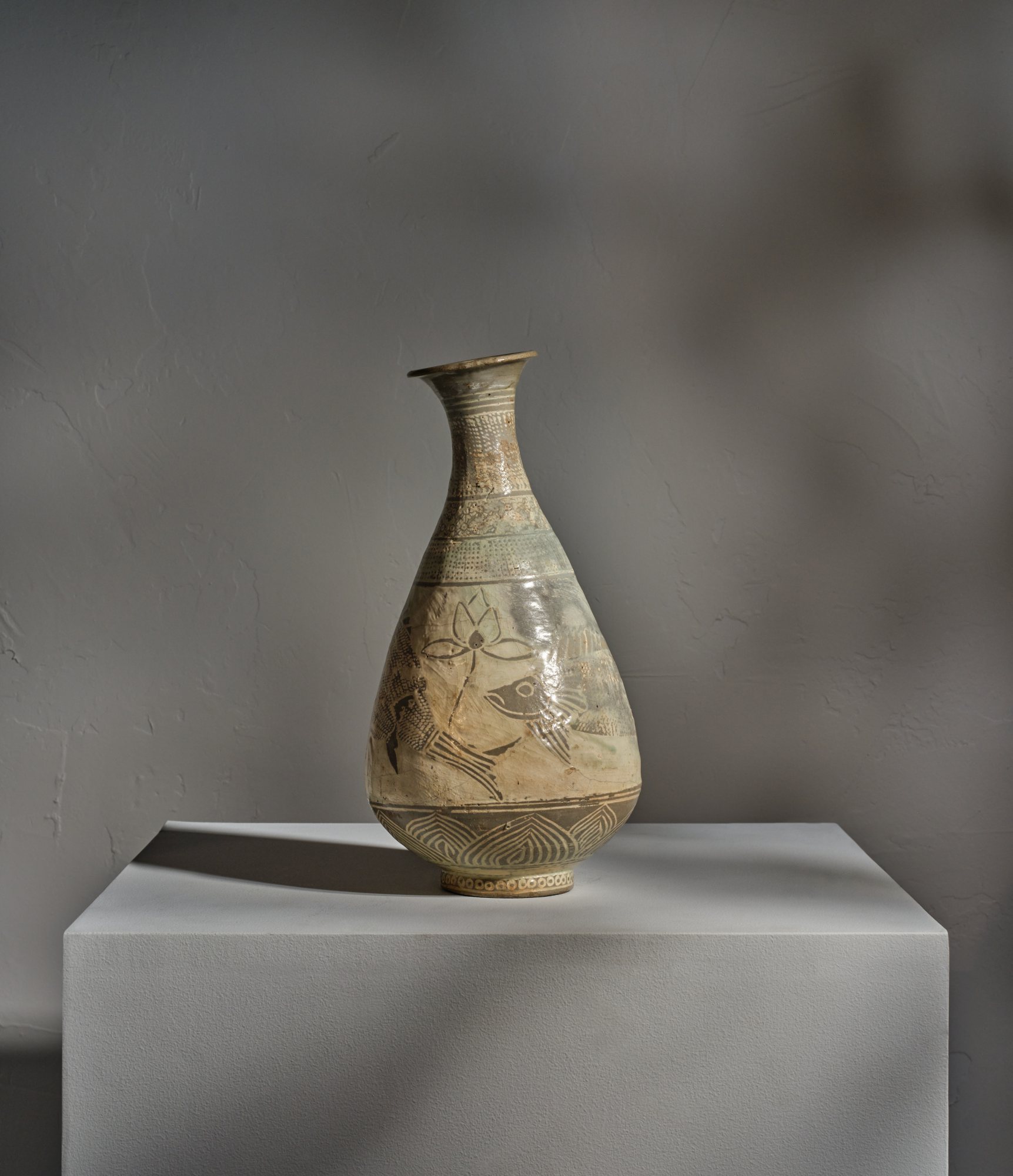 An incised and inlaid Buncheong 'fish' pear-shaped vase, Joseon dynasty ...