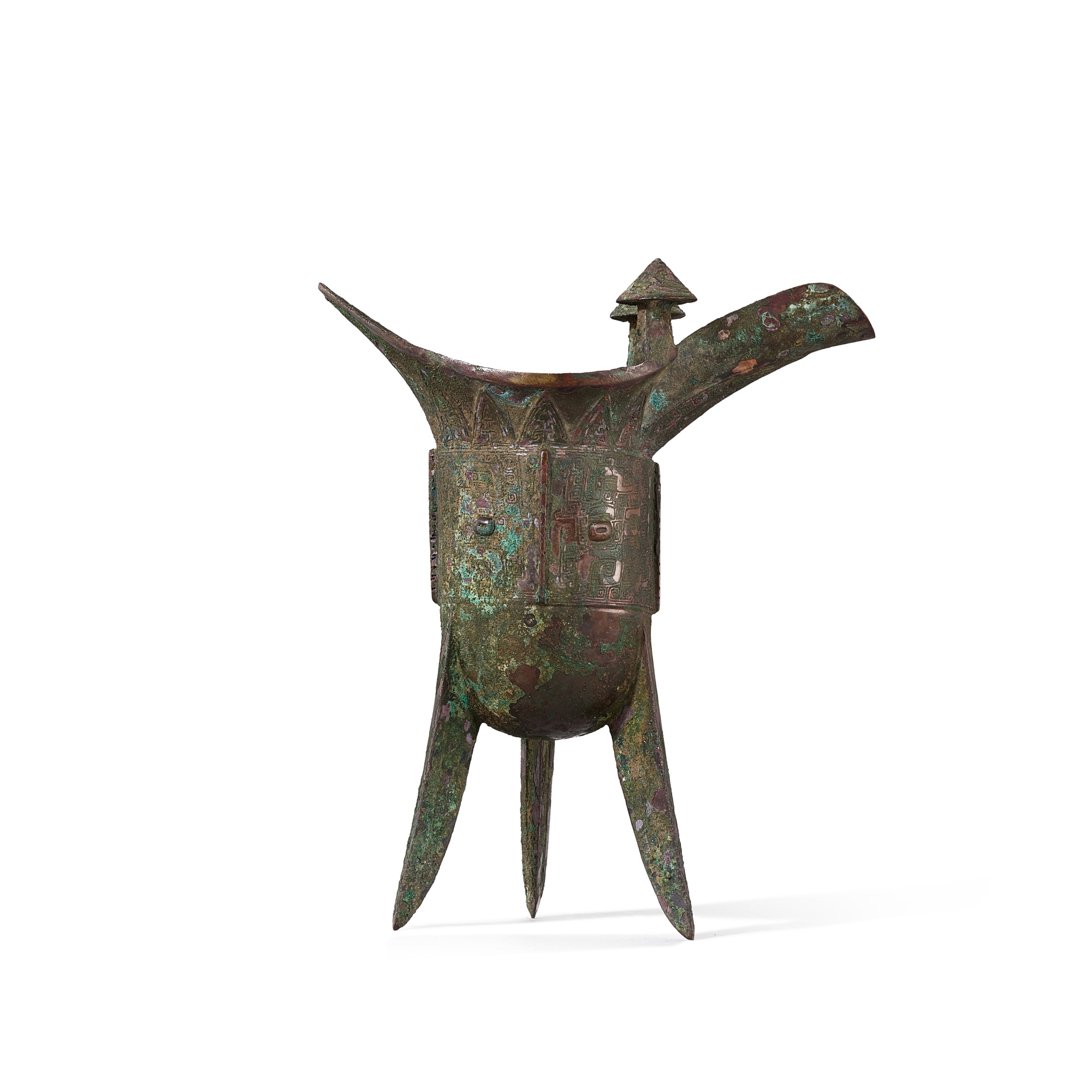 A bronze 'mythical beast' tripod ritual wine vessel, jue, Late Shang ...