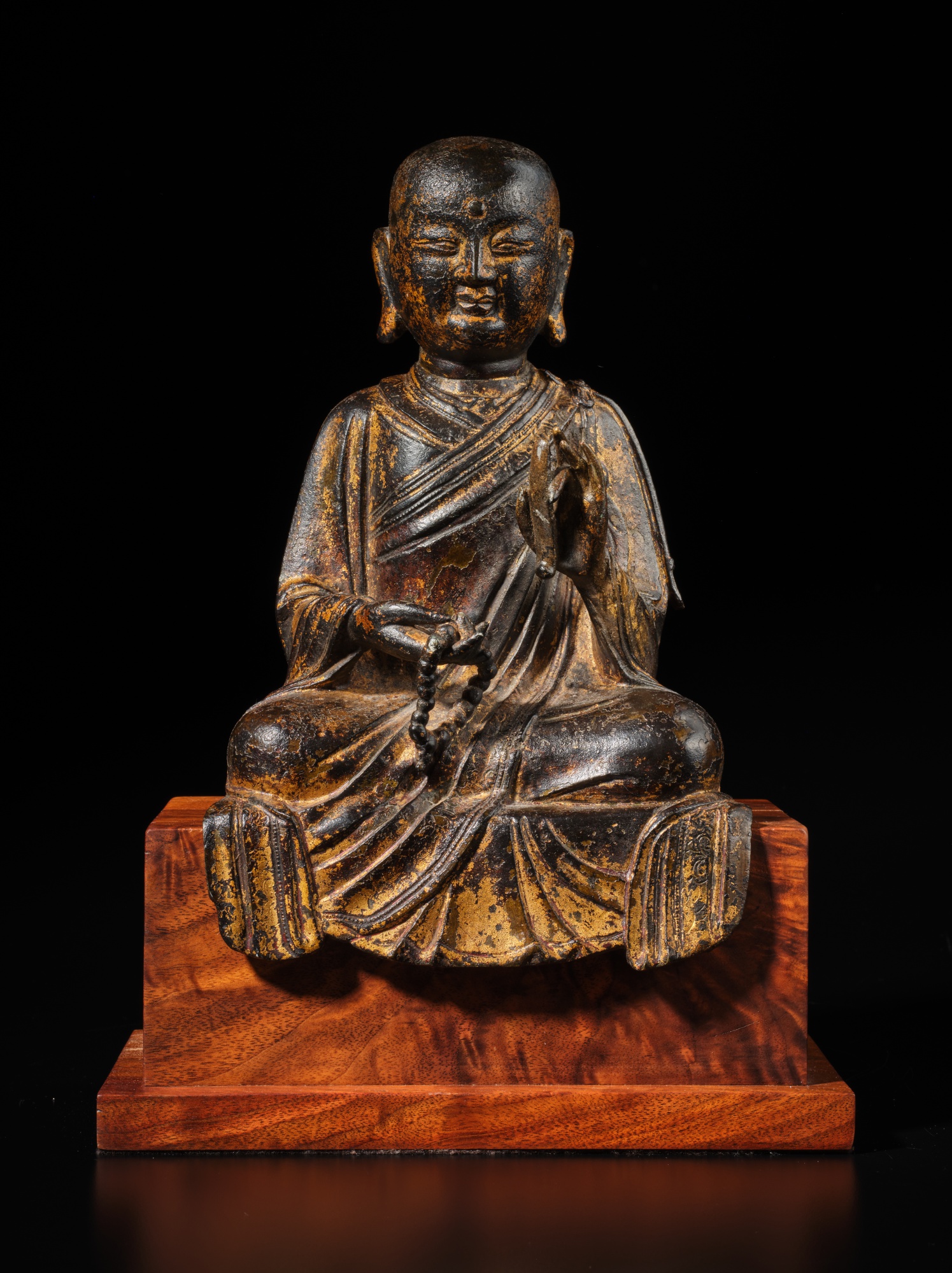 A gilt-bronze figure of a seated monk, Late Ming Dynasty | Dharma and ...