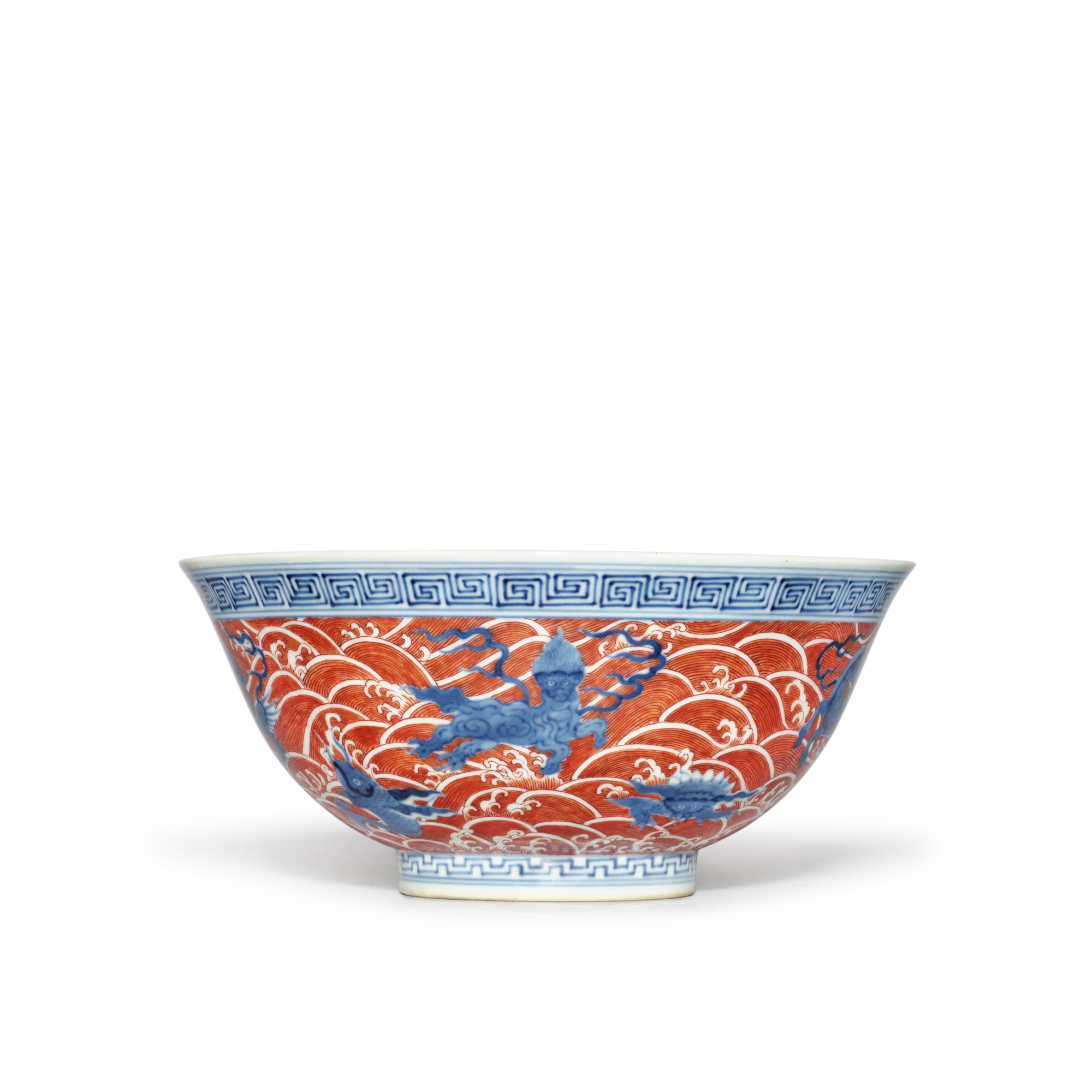 An iron-red and underglaze-blue 'mythical beasts' bowl, Mark and period ...