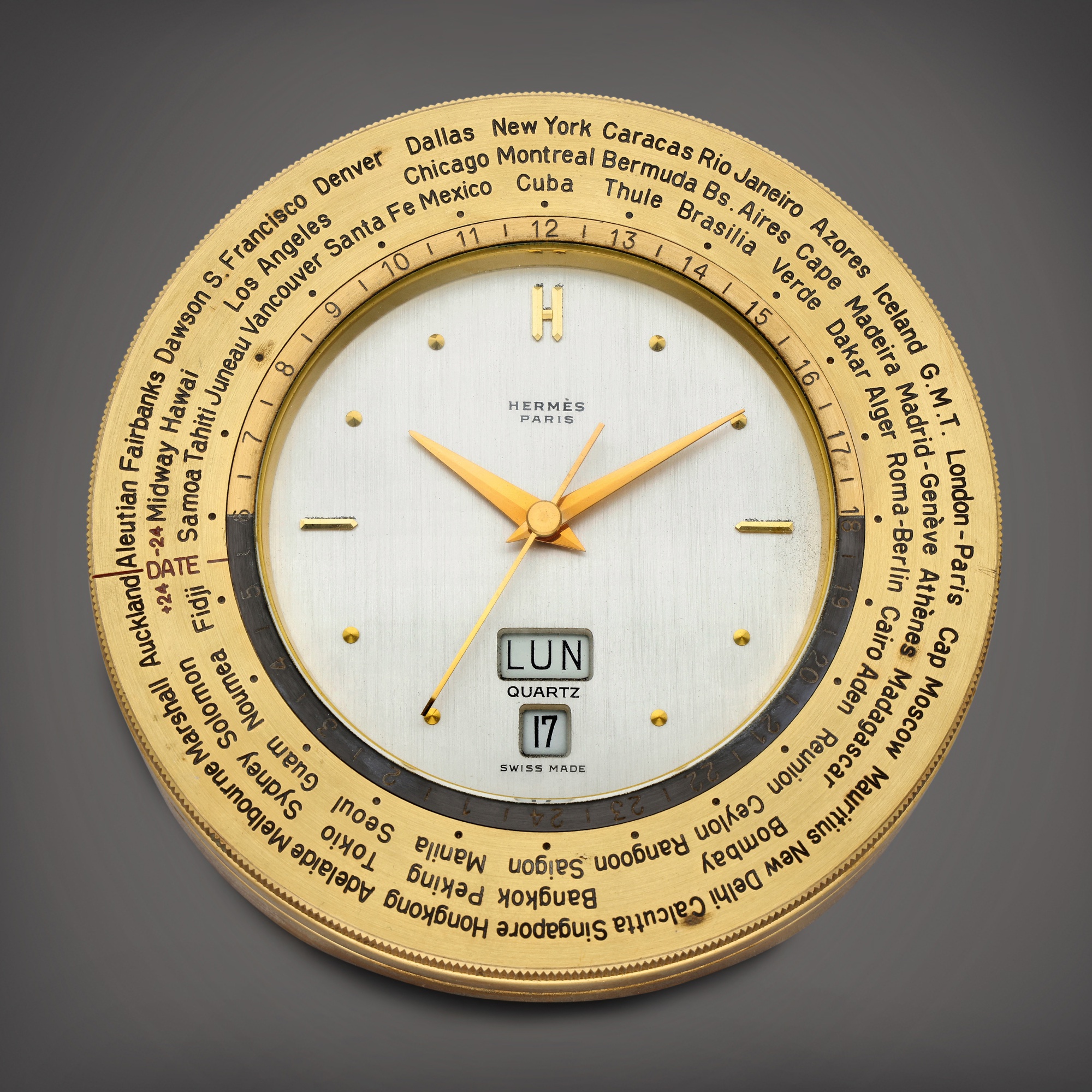 A brass world time desk clock with day and date, Circa 1970 | Fine ...