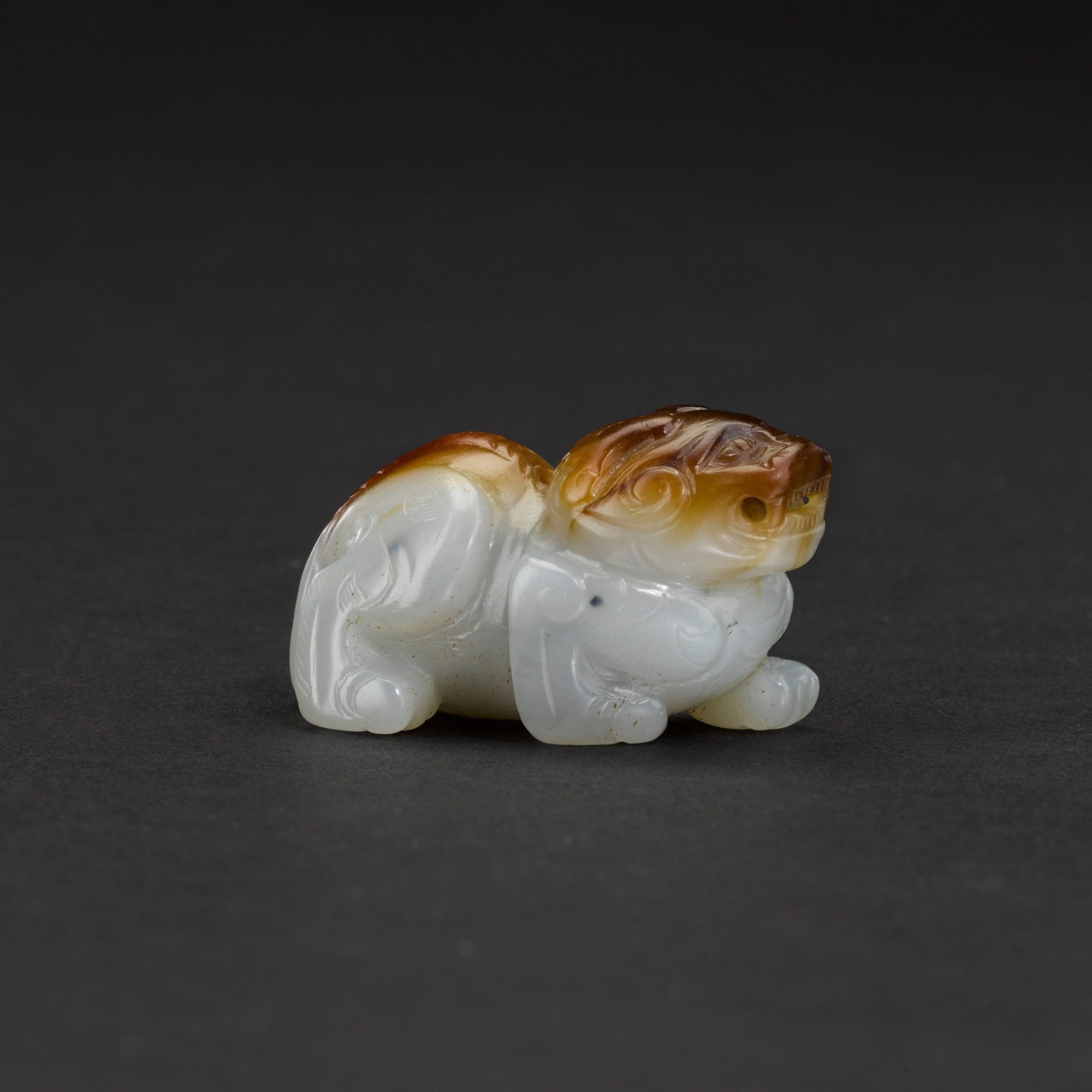 A white and brown jade chimera, Song-Ming dynasty | 宋至明 白玉辟邪 | HOTUNG ...