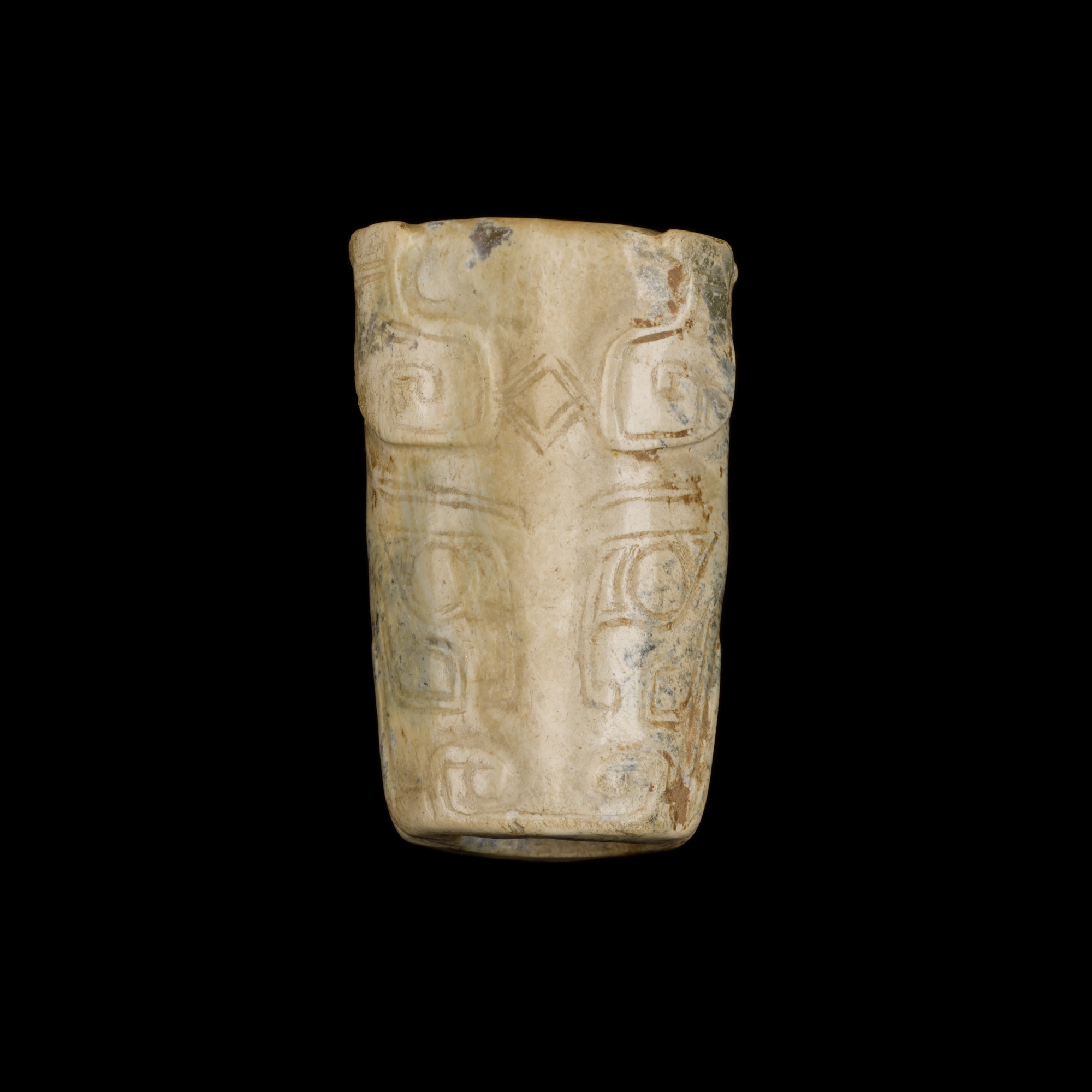 A cylindrical jade 'taotie' bead, Shang dynasty | 商 饕餮紋玉管 | HOTUNG | 何東 ...