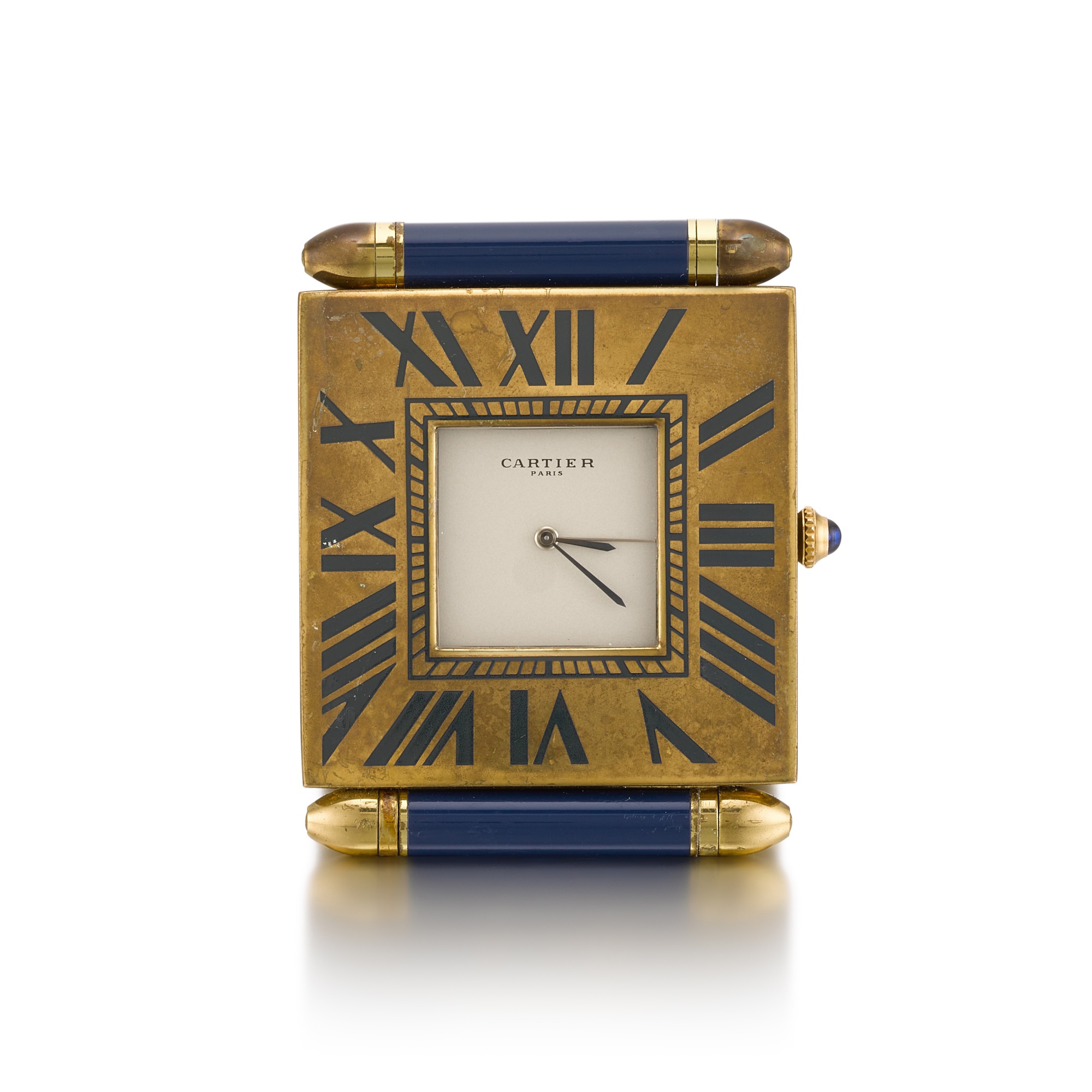 A gilt-brass and enamel travelling timepiece, Cartier, Paris, circa ...