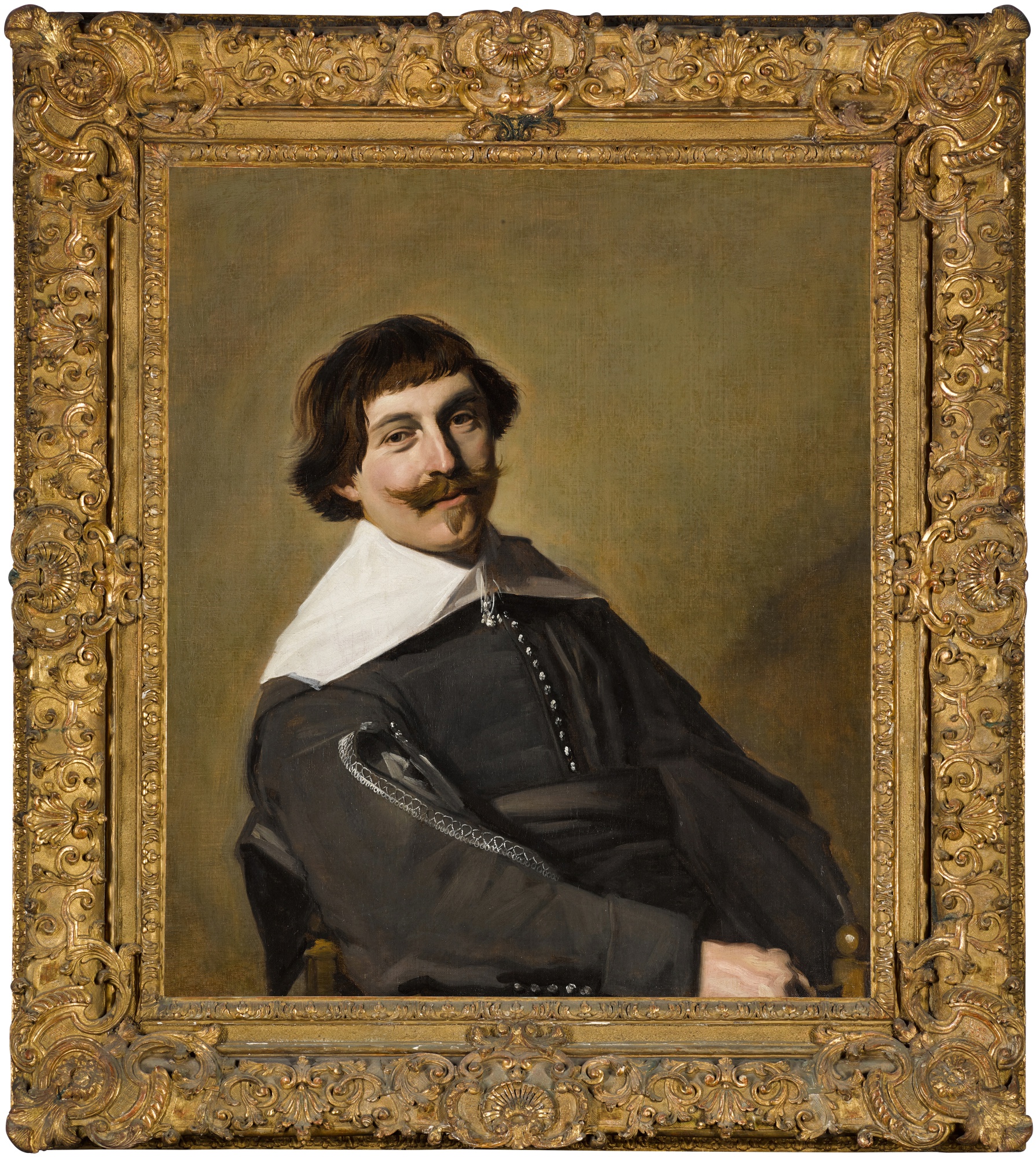 Portrait of a man, three-quarter-length, wearing black with a white ...
