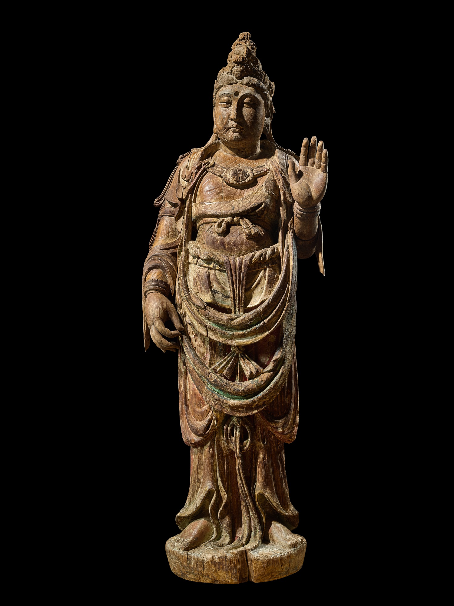 A magnificent and extremely rare large painted wood standing figure of ...