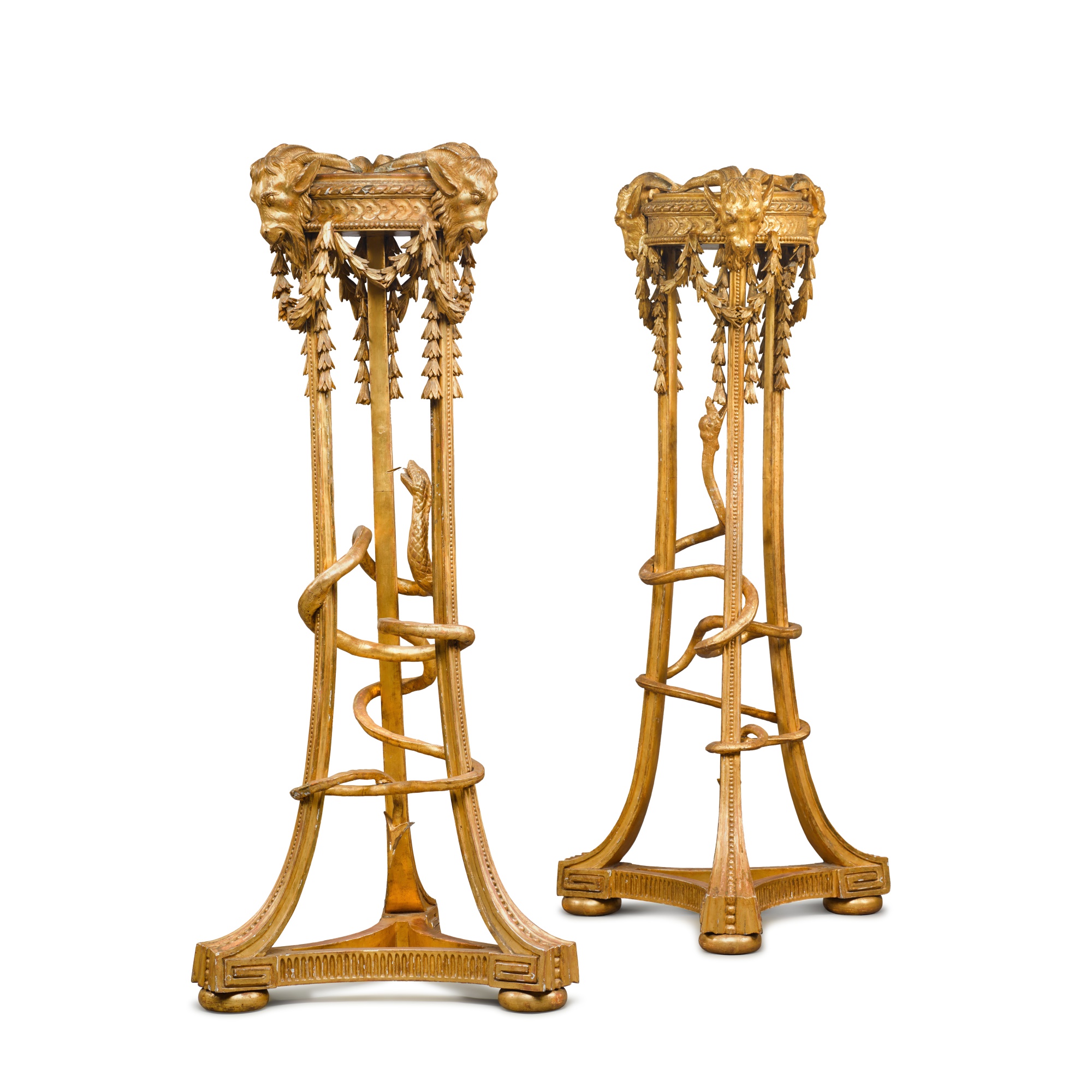 A pair of George III carved giltwood torcheres by Mayhew and Ince, 1772 ...