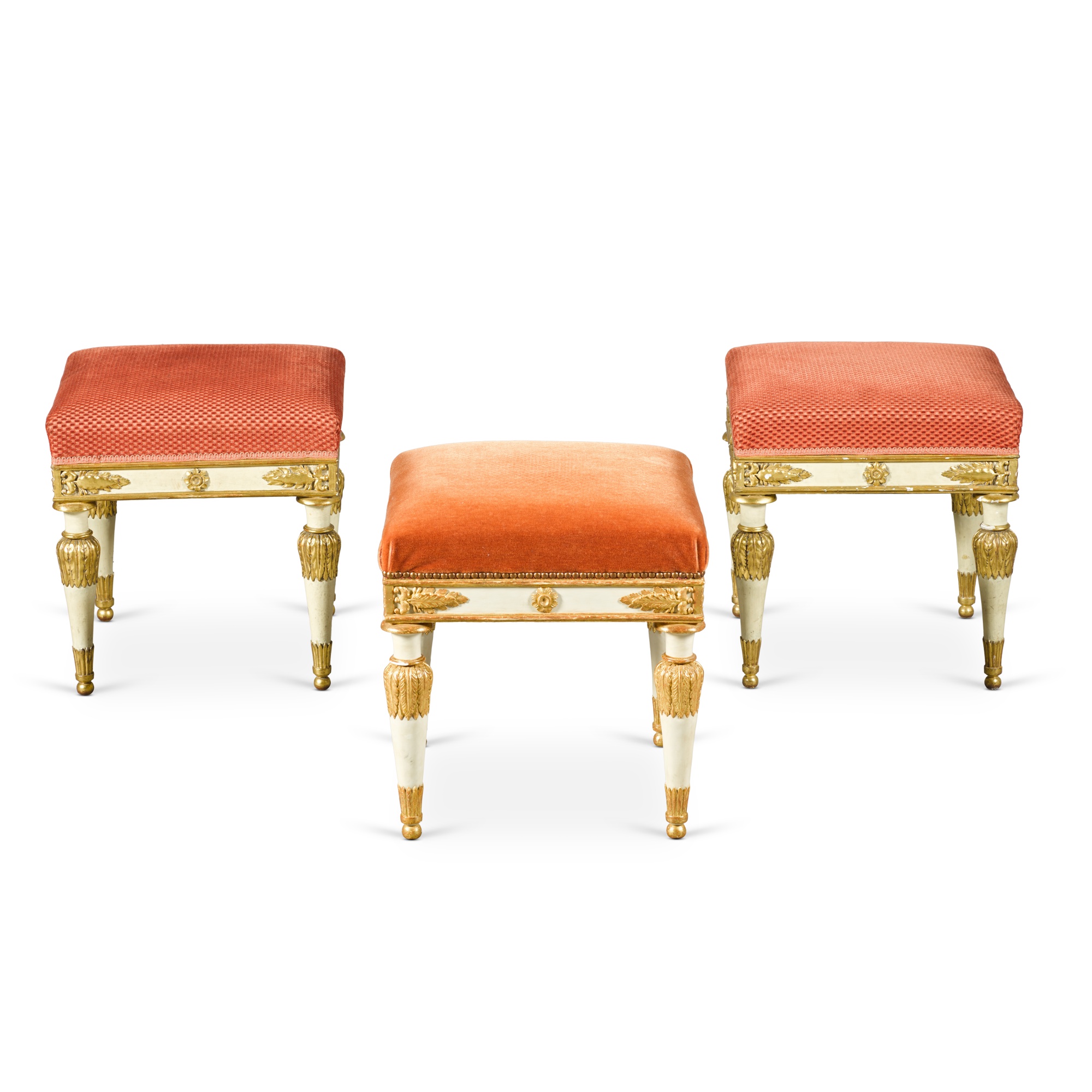 A group of three painted and giltwood stools, one Italian late 18th ...