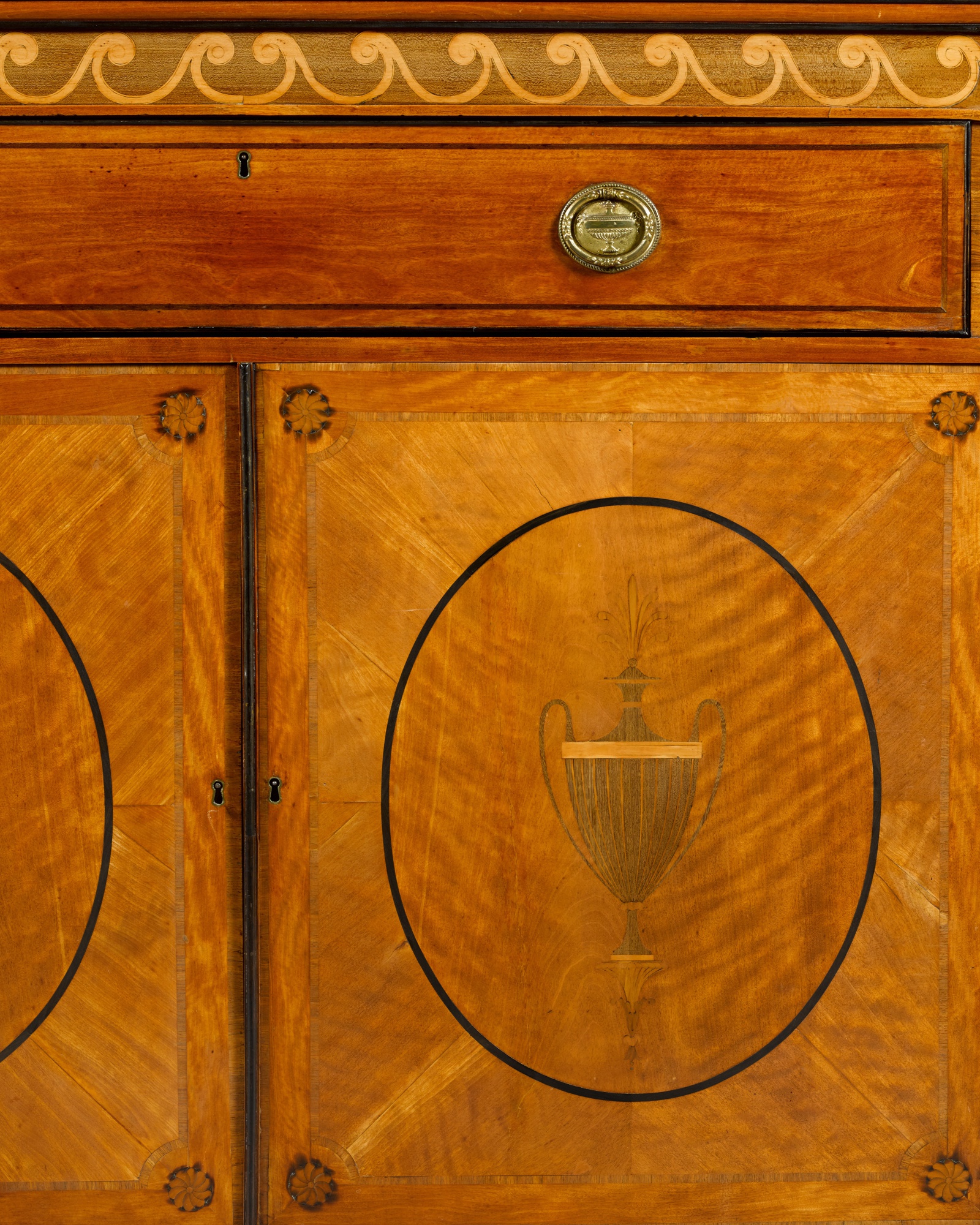 A George III satinwood, amaranth and marquetry breakfront bookcase ...