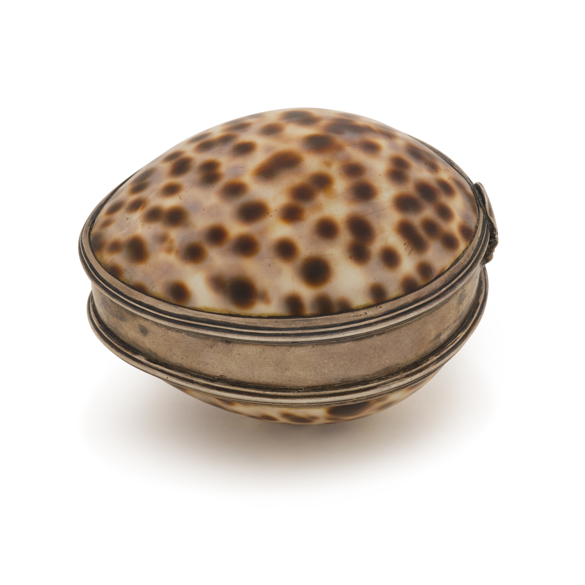A silver-mounted cowrie shell tobacco box, unidentified mark, probably ...