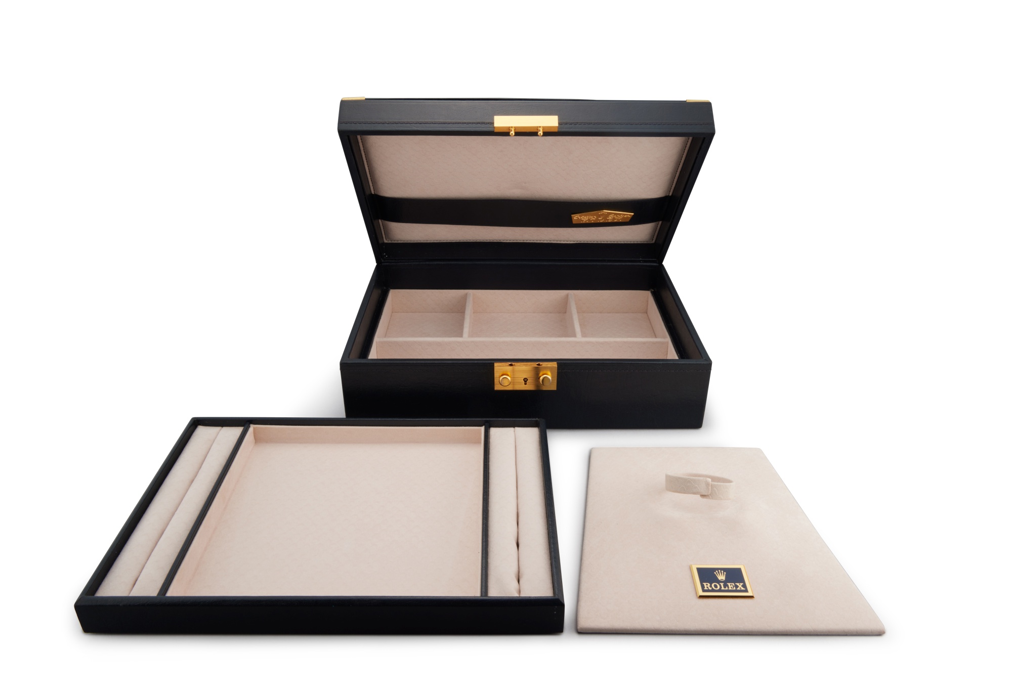 A leather presentation watch box with jewelry storage, Circa 1985 ...