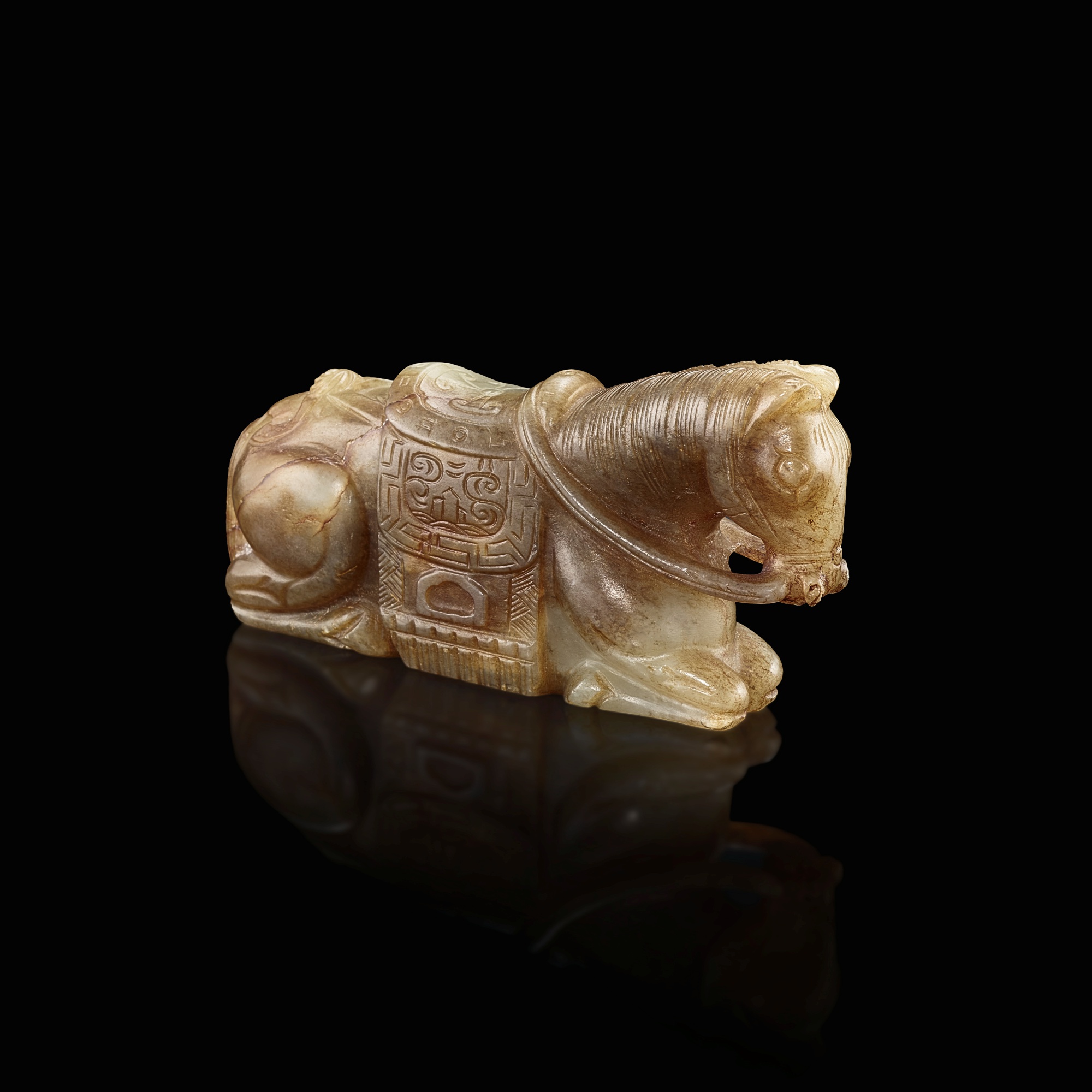 A celadon and russet jade recumbent horse, Ming dynasty 明 青白玉臥馬 | The ...