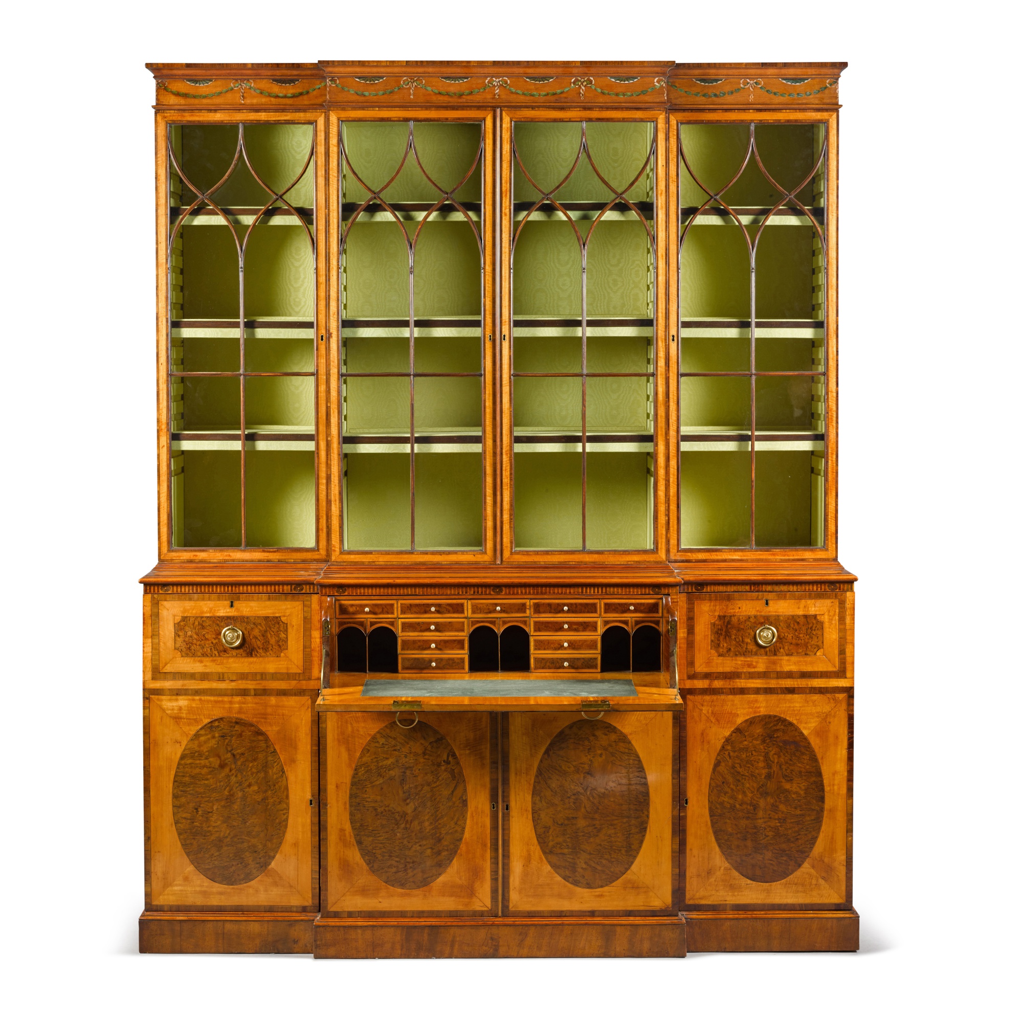 A George III mahogany, satinwood and burr walnut breakfront bookcase ...