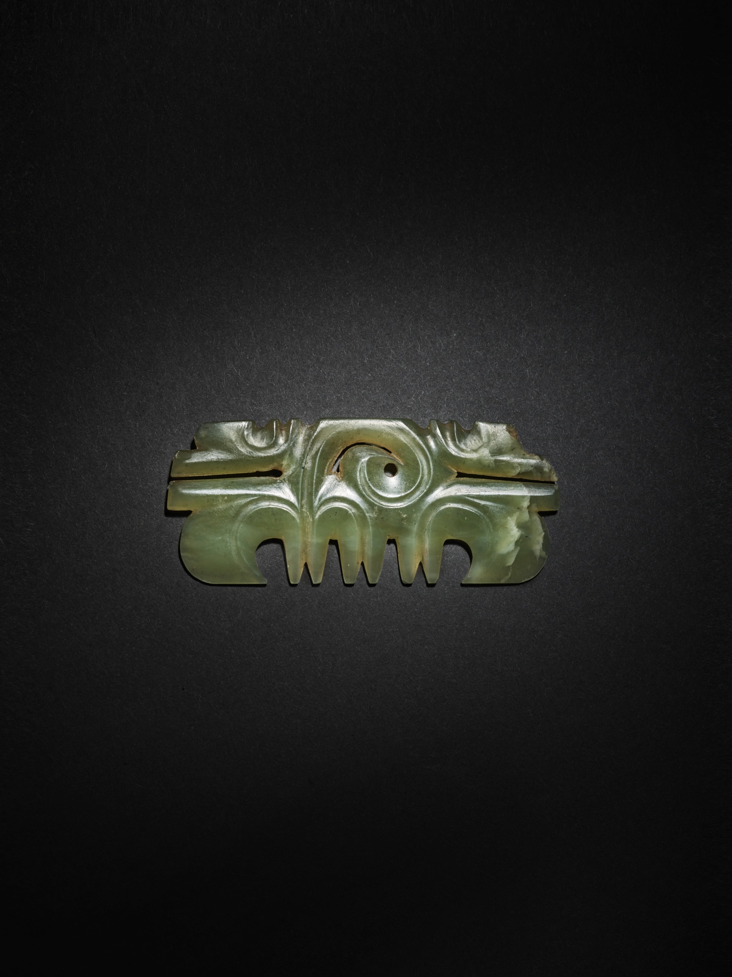 An archaic green jade cloud-shaped pendant, Neolithic period, Hongshan ...