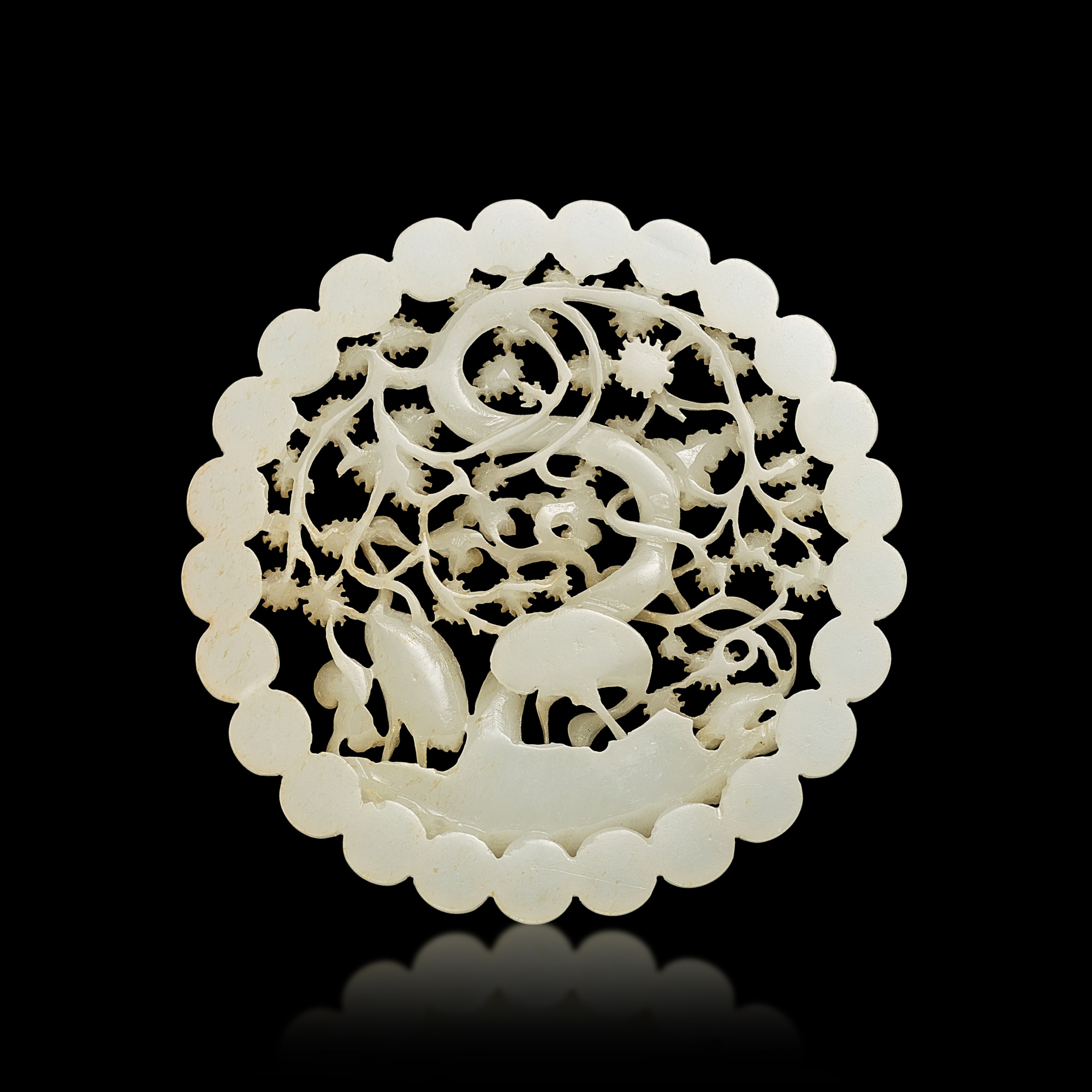 A reticulated white jade 'pine and crane' plaque, Qing dynasty, 18th ...