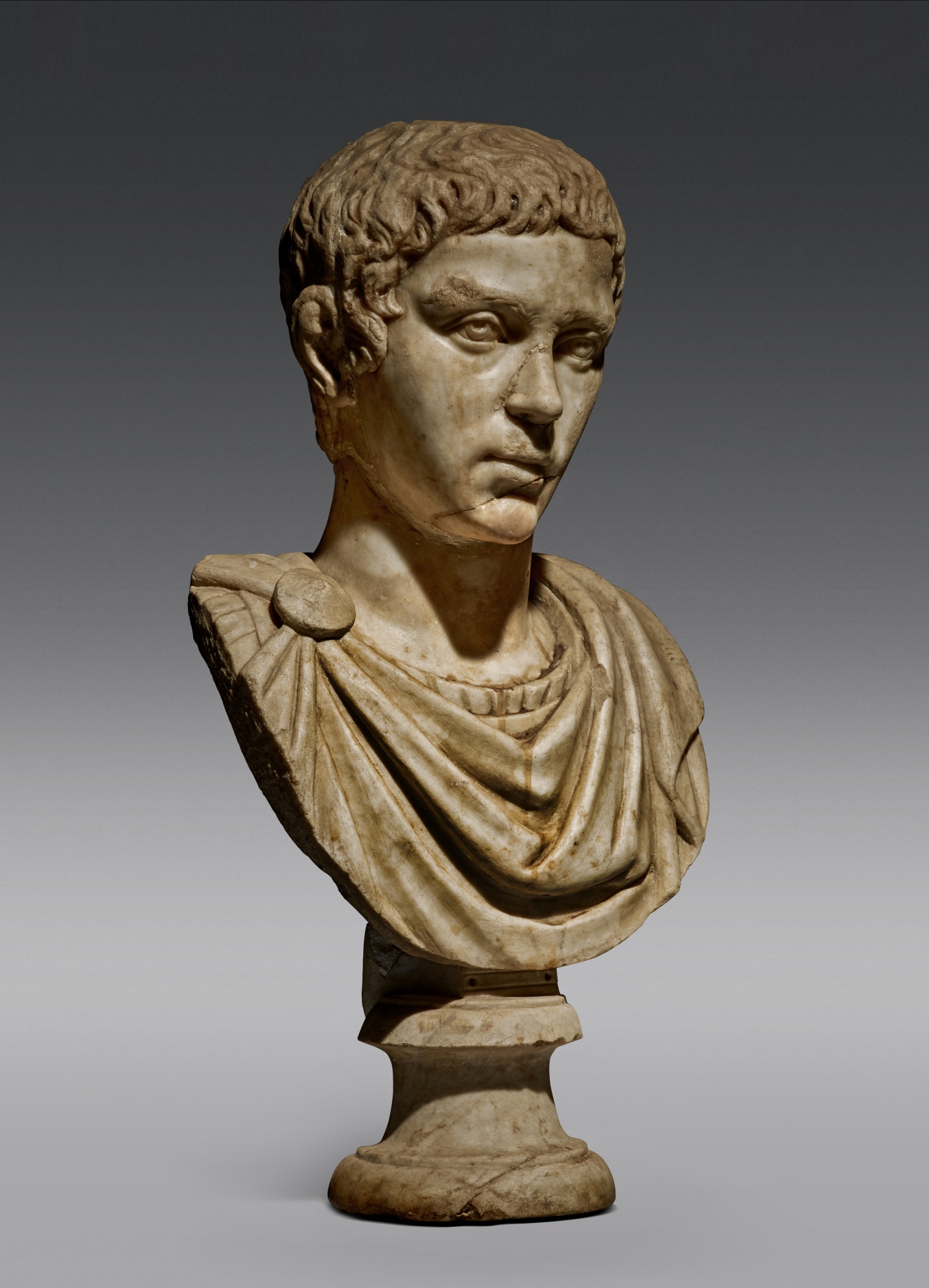 A Fragmentary Roman Marble Portrait Head of a Youth, circa 200 A.D., on ...