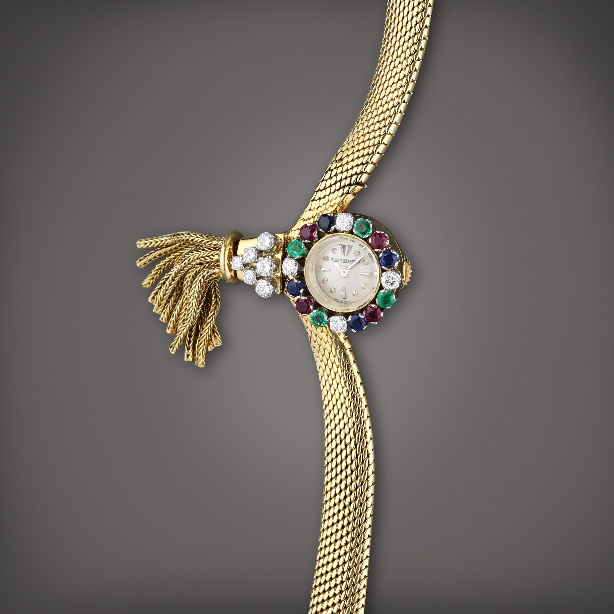 Reference 7368 | A yellow gold and diamond, emerald, ruby, and sapphire ...