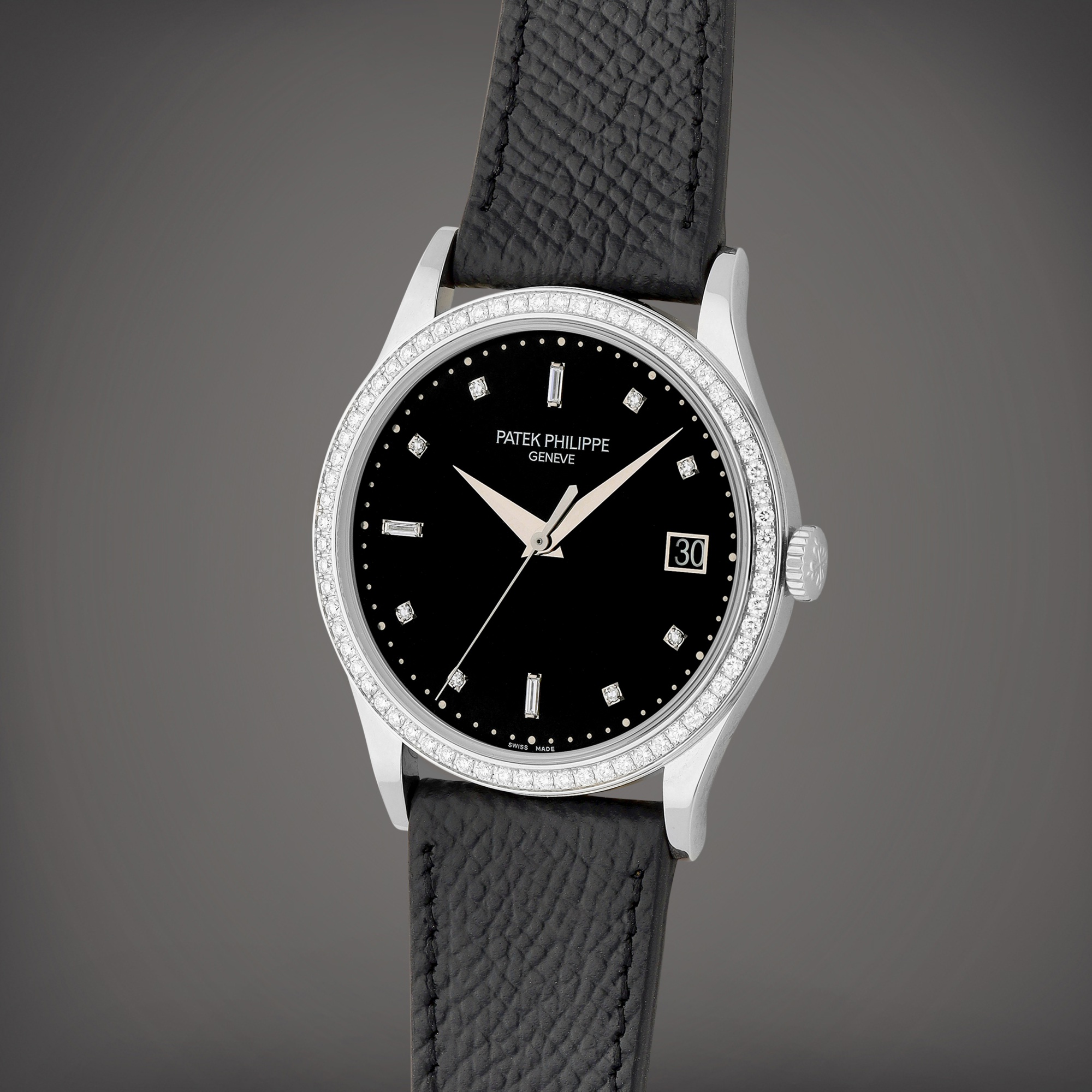 Reference 5297 | A white gold and diamond-set wristwatch with date ...