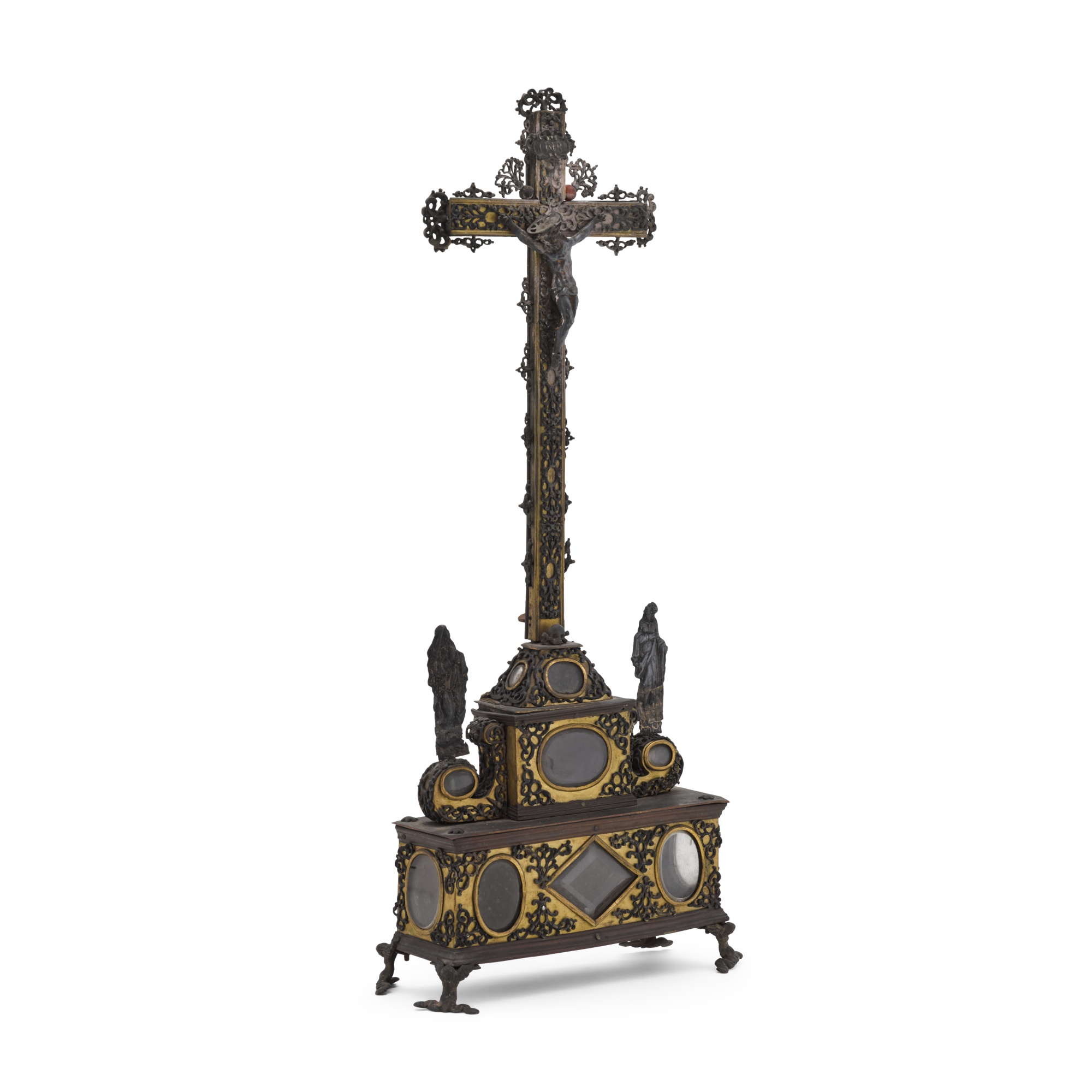 A Continental gilt-brass and pierced metal reliquary in the form of a ...