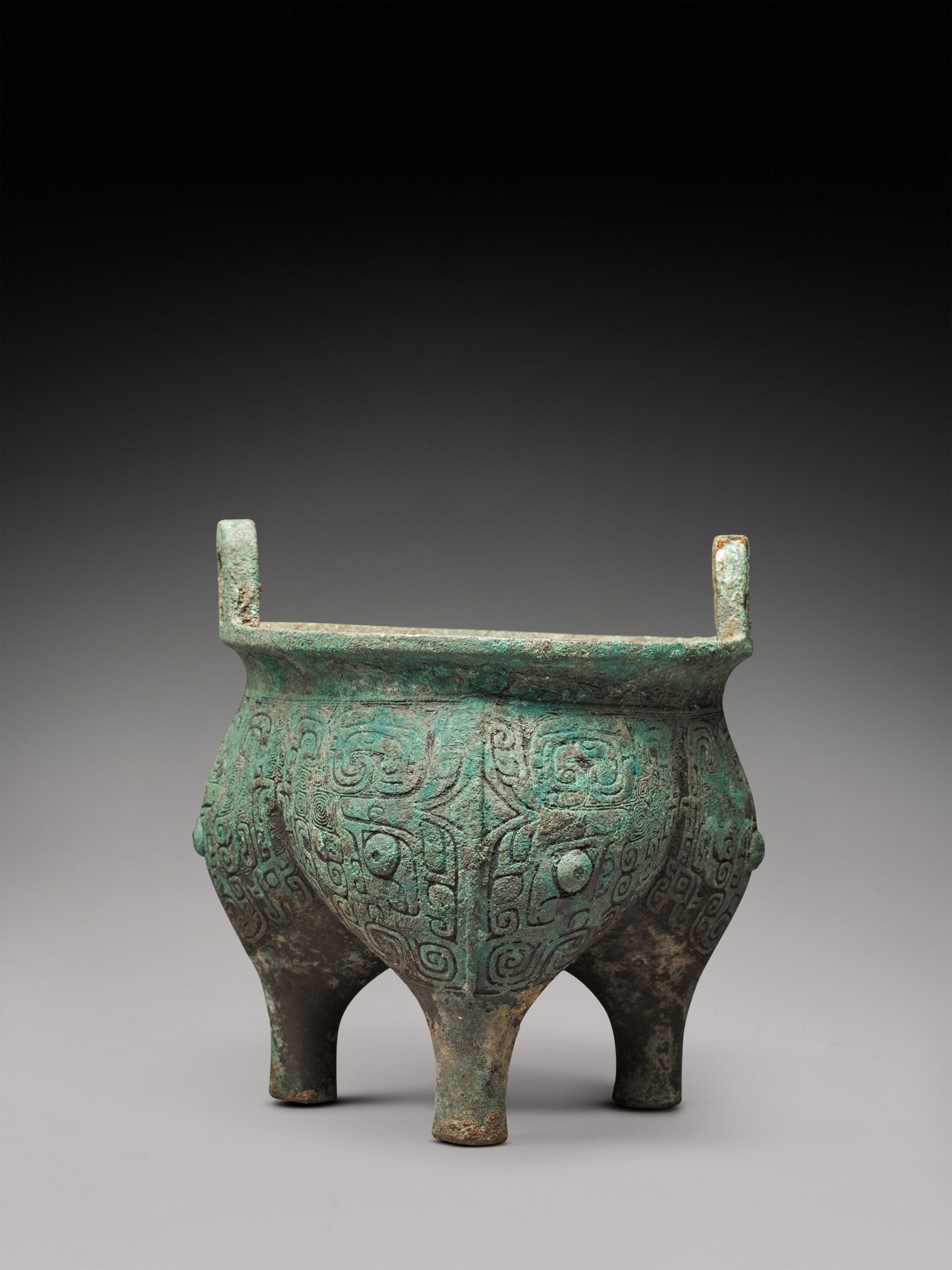 An archaic bronze ritual tripod food vessel (Liding), late Shang ...