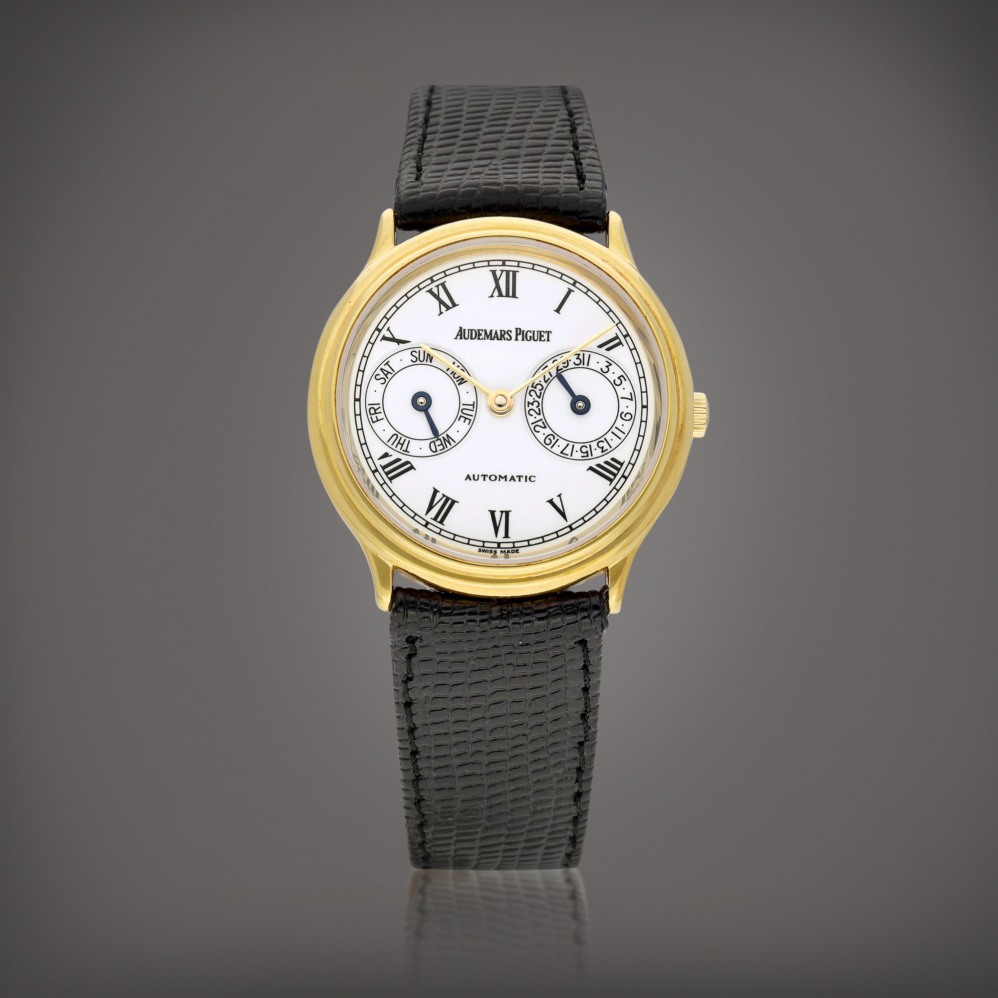 Reference 25574BA | A yellow gold wristwatch with day, date and enamel ...