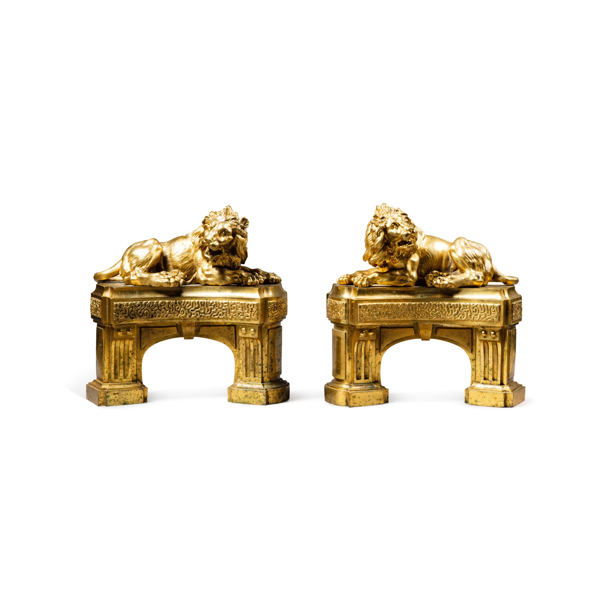 A pair of Louis XV gilt-bronze fire dogs, attributed to Philippe ...