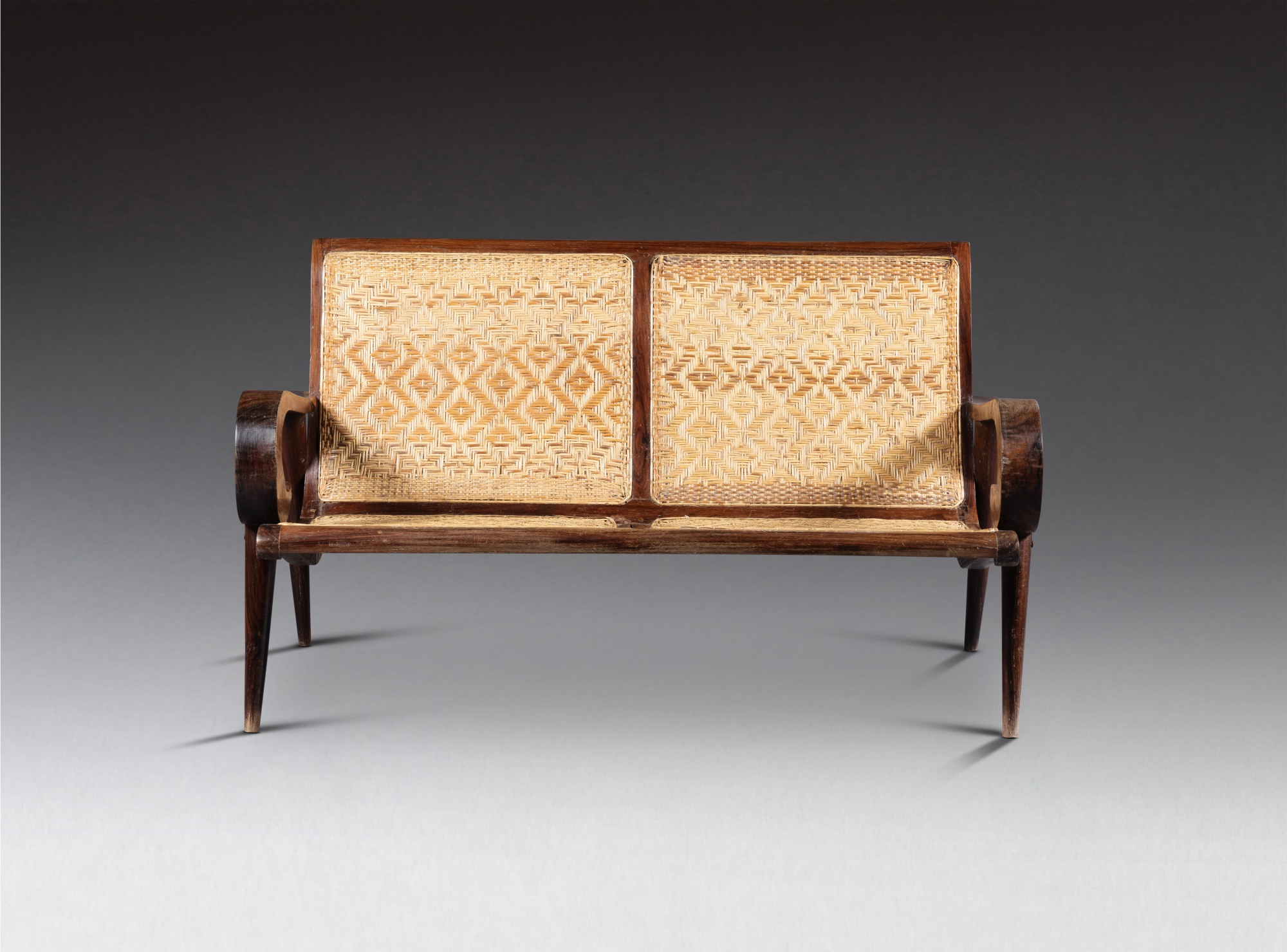 An Indian sissoo caned settee, mid-20th century | Canapé canné en ...