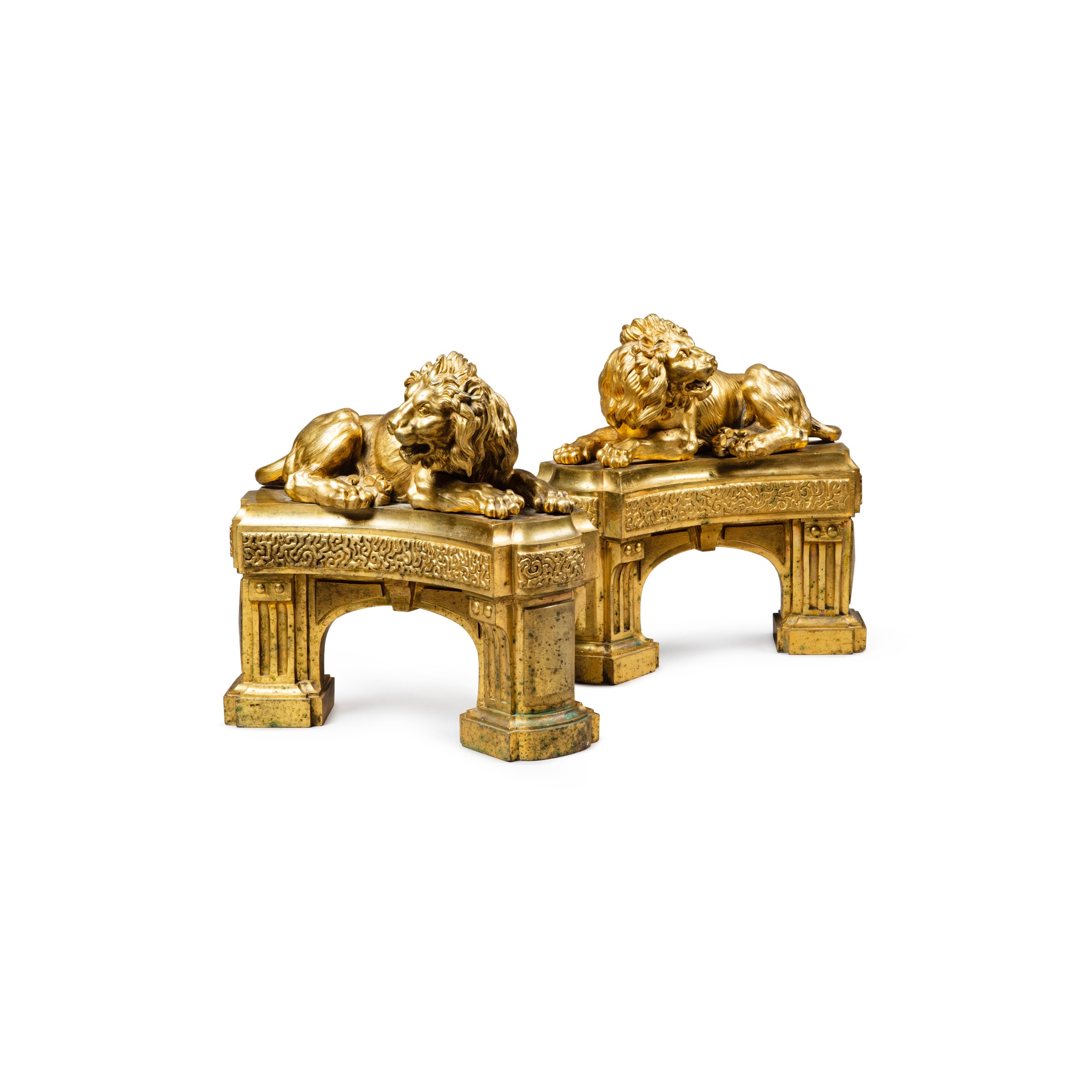 A pair of Louis XV gilt-bronze fire dogs, attributed to Philippe ...