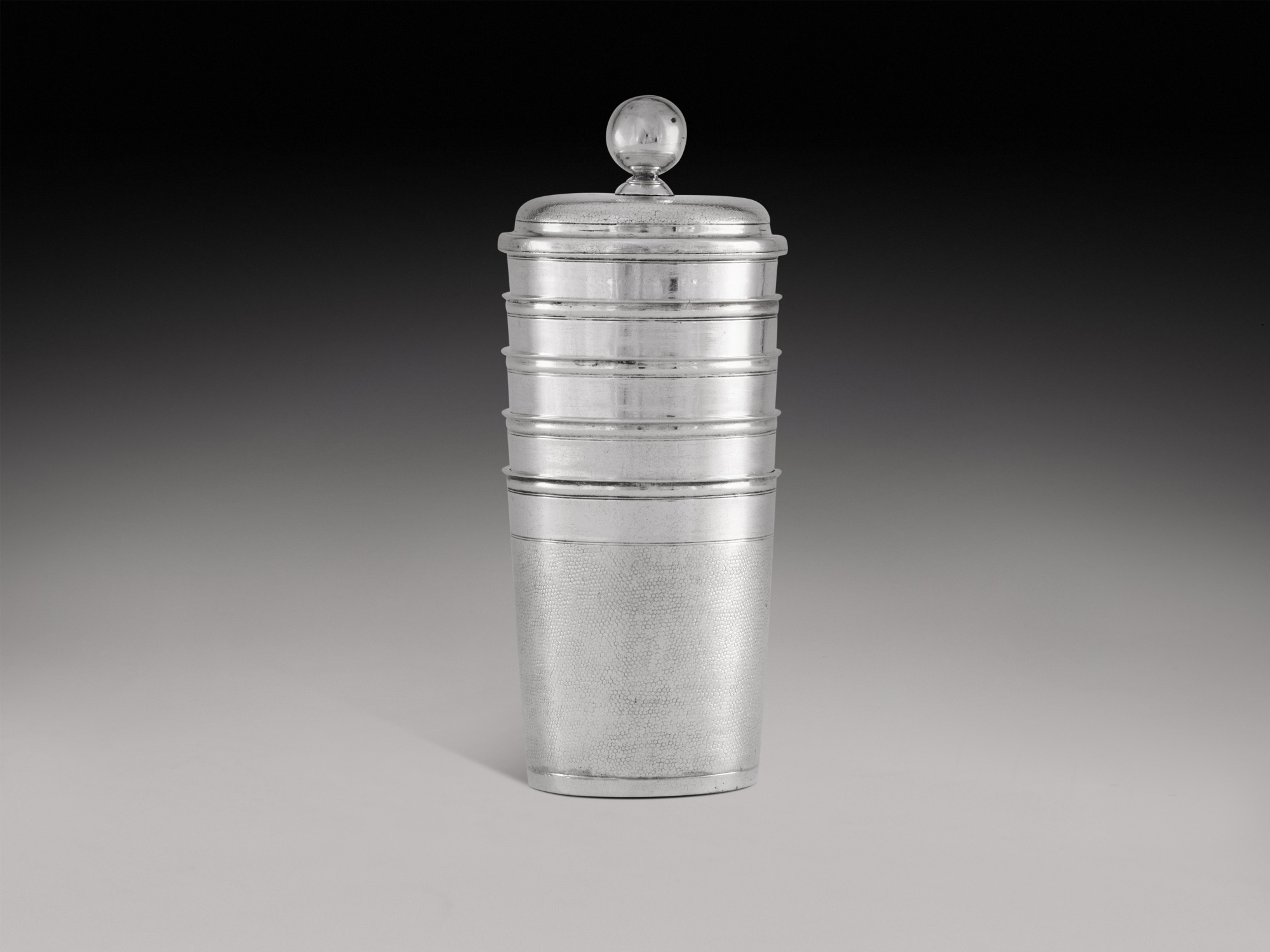 A set of five German parcel-gilt silver stacking beakers, Johann Wagner ...