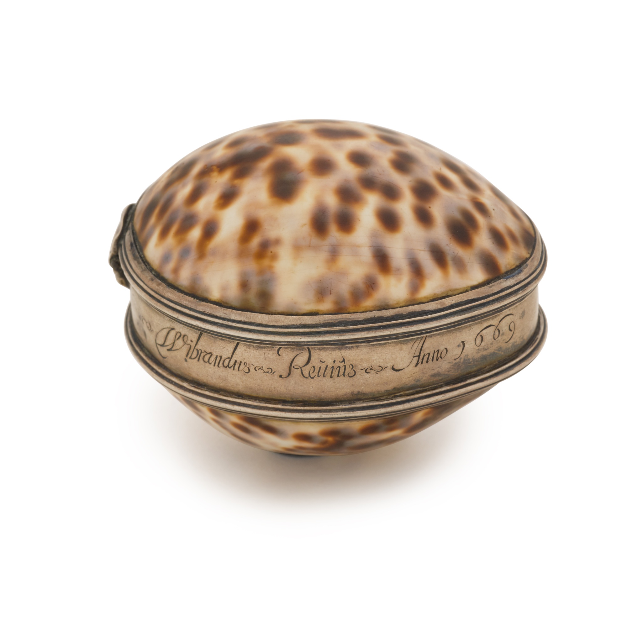 A silver-mounted cowrie shell tobacco box, unidentified mark, probably ...