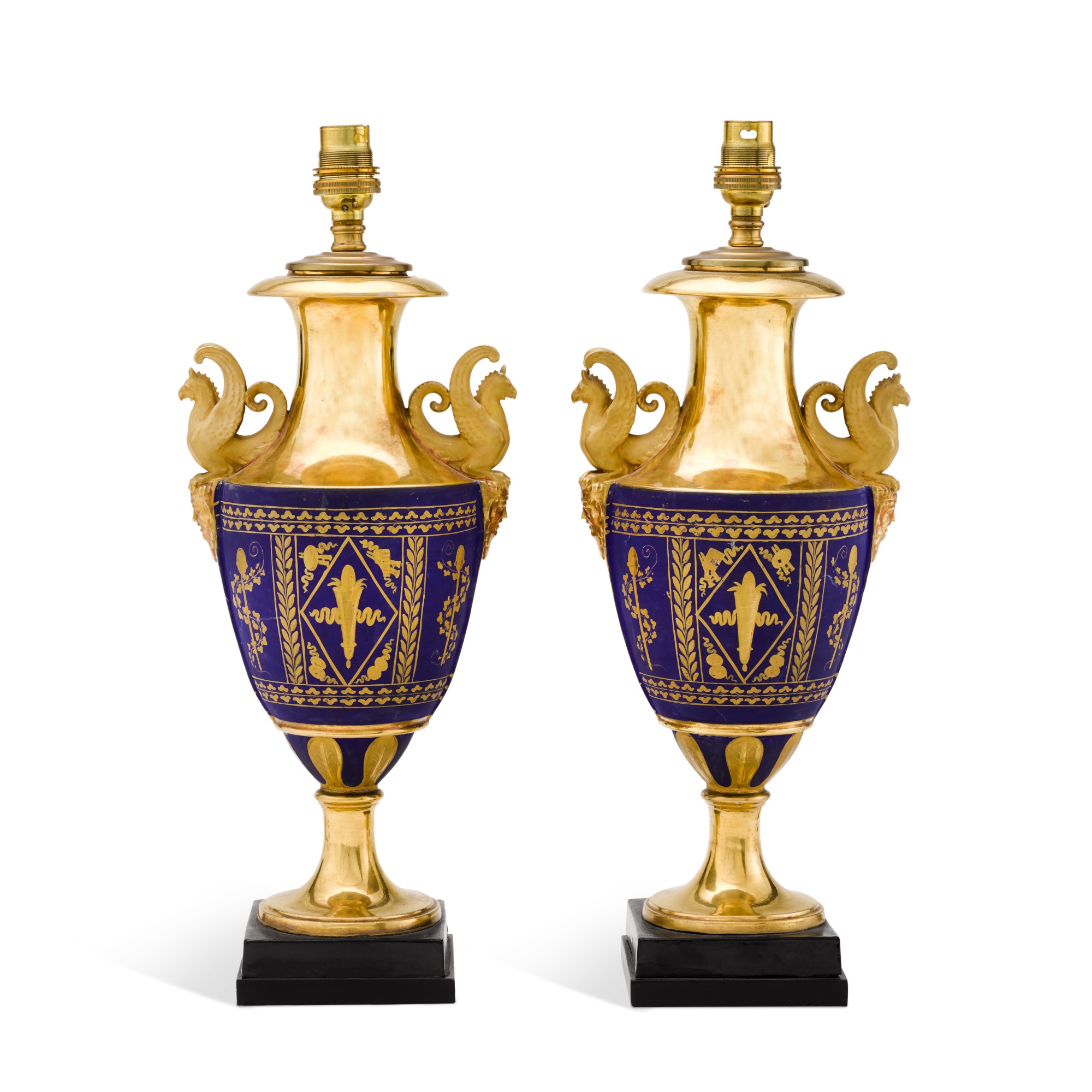 A pair of Paris porcelain gilt and matt-blue-ground vases mounted as ...
