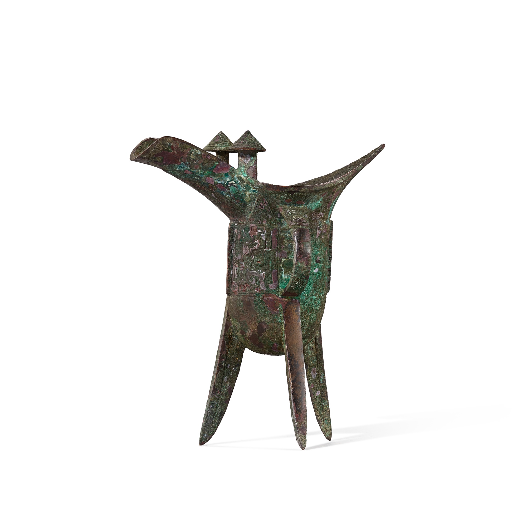 A bronze 'mythical beast' tripod ritual wine vessel, jue, Late Shang ...