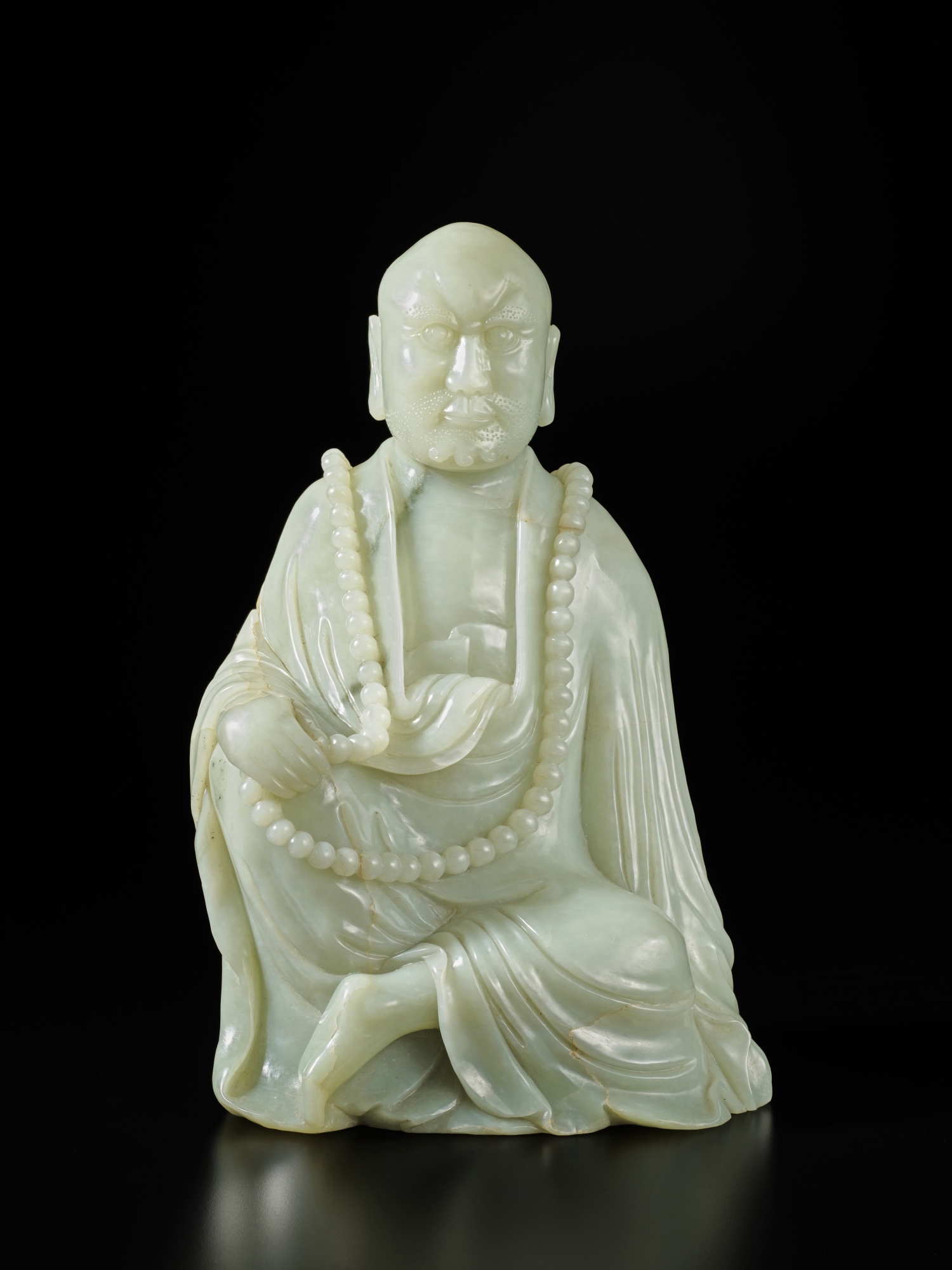 A large celadon jade seated figure of a Luohan, 19th / 20th century ...