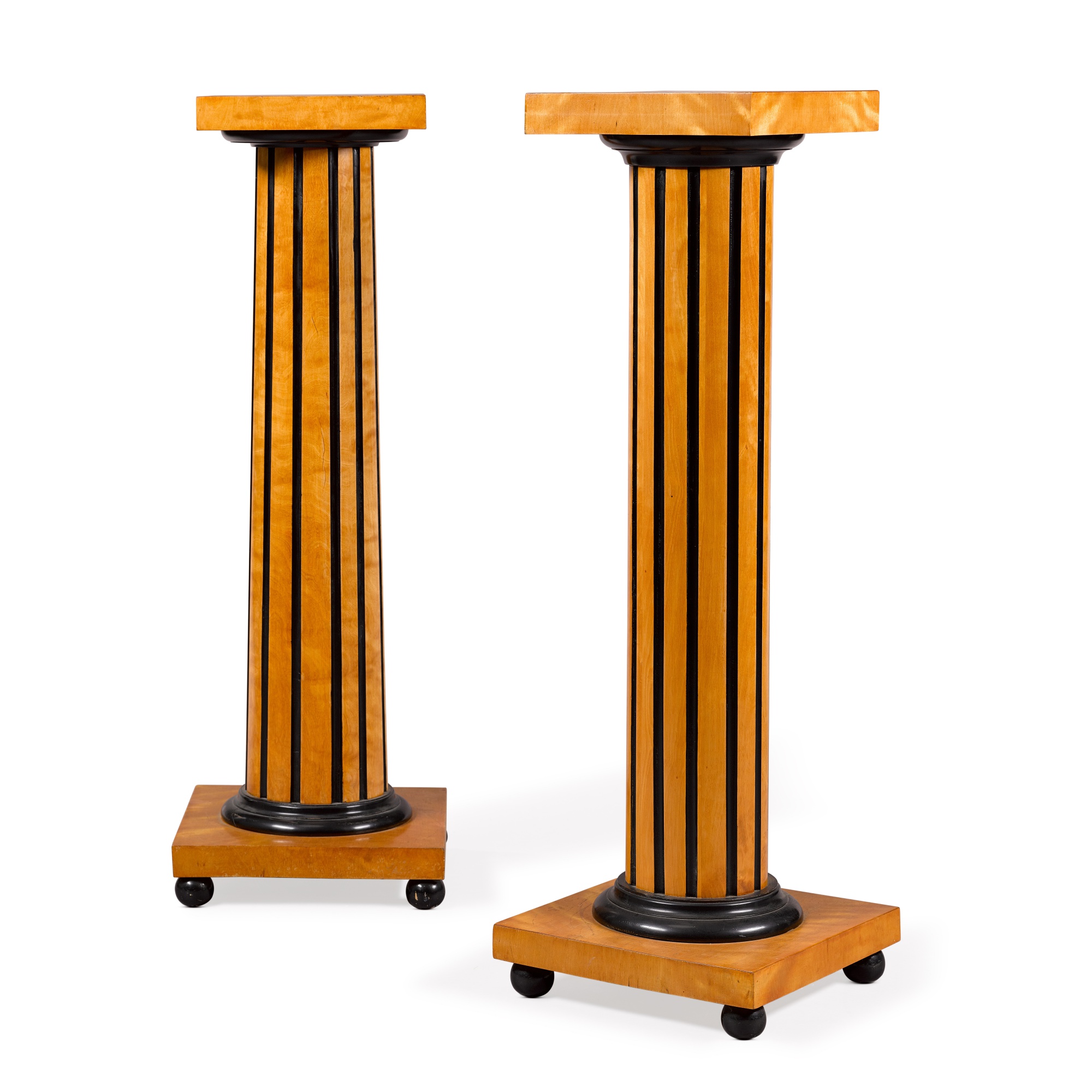 A pair of ebonised and satinwood columnar pedestals | Freddie Mercury ...