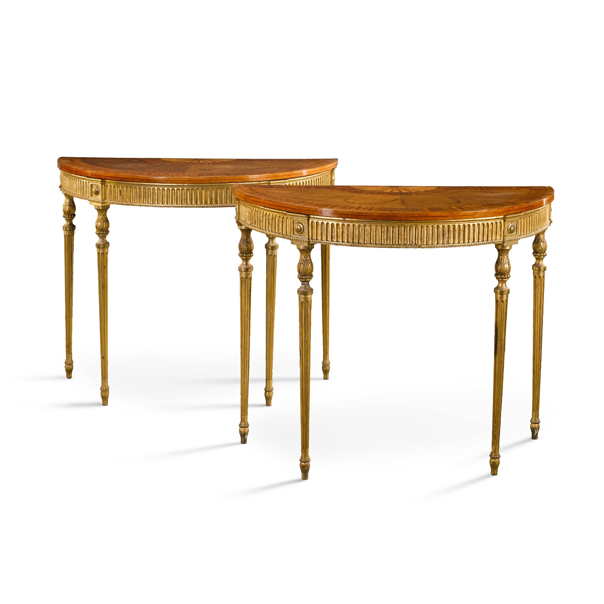 A pair of George III giltwood and marquetry demi-lune pier tables ...