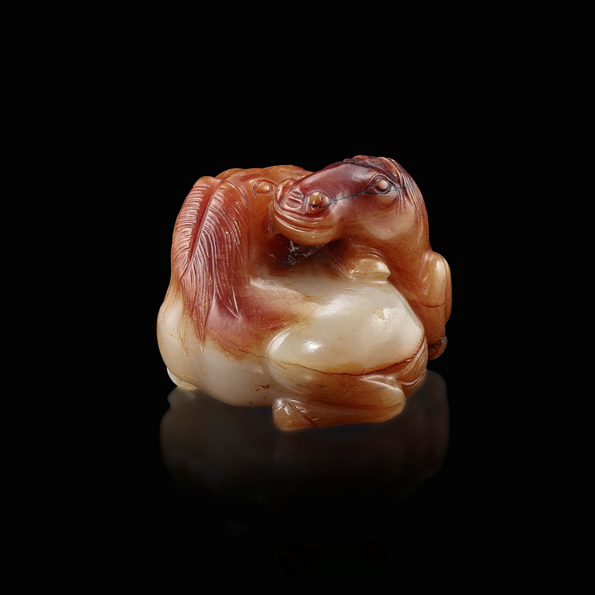 A white and russet jade 'double horse' group, Song dynasty or later ...